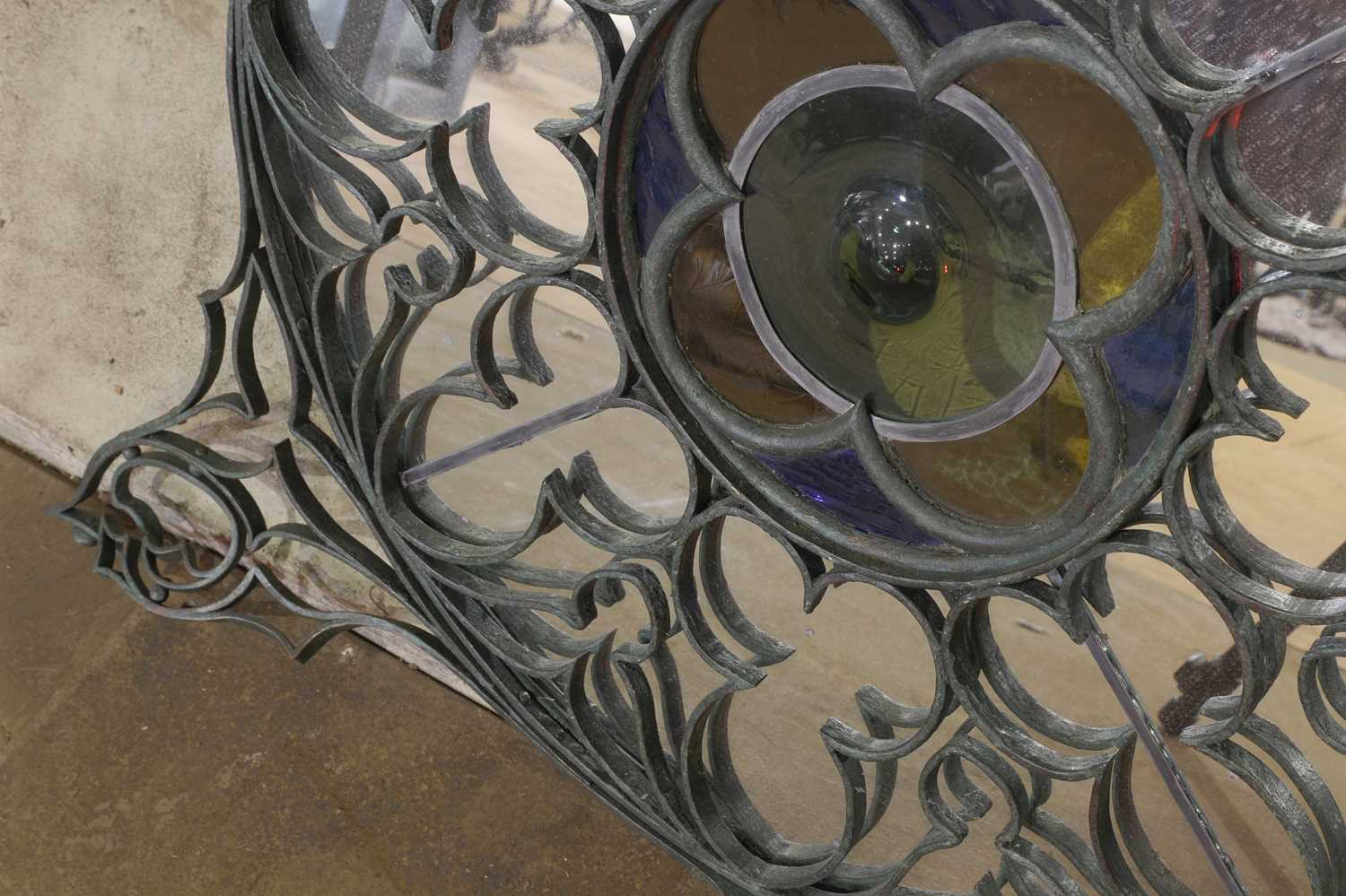 Lot 23 - A cast iron window-frame mantelpiece mirror,
