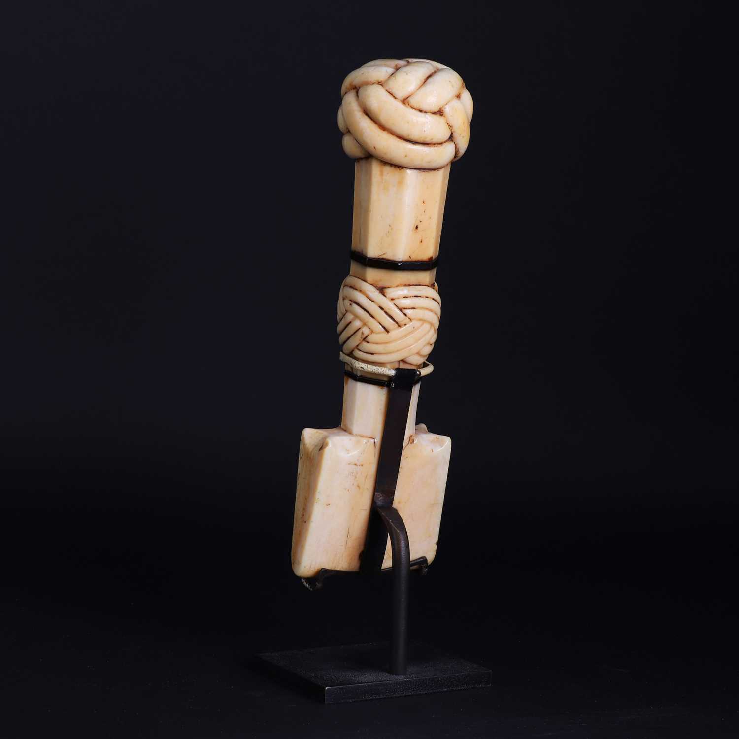 Lot 93 - A sailor's whale tooth seam rubber,