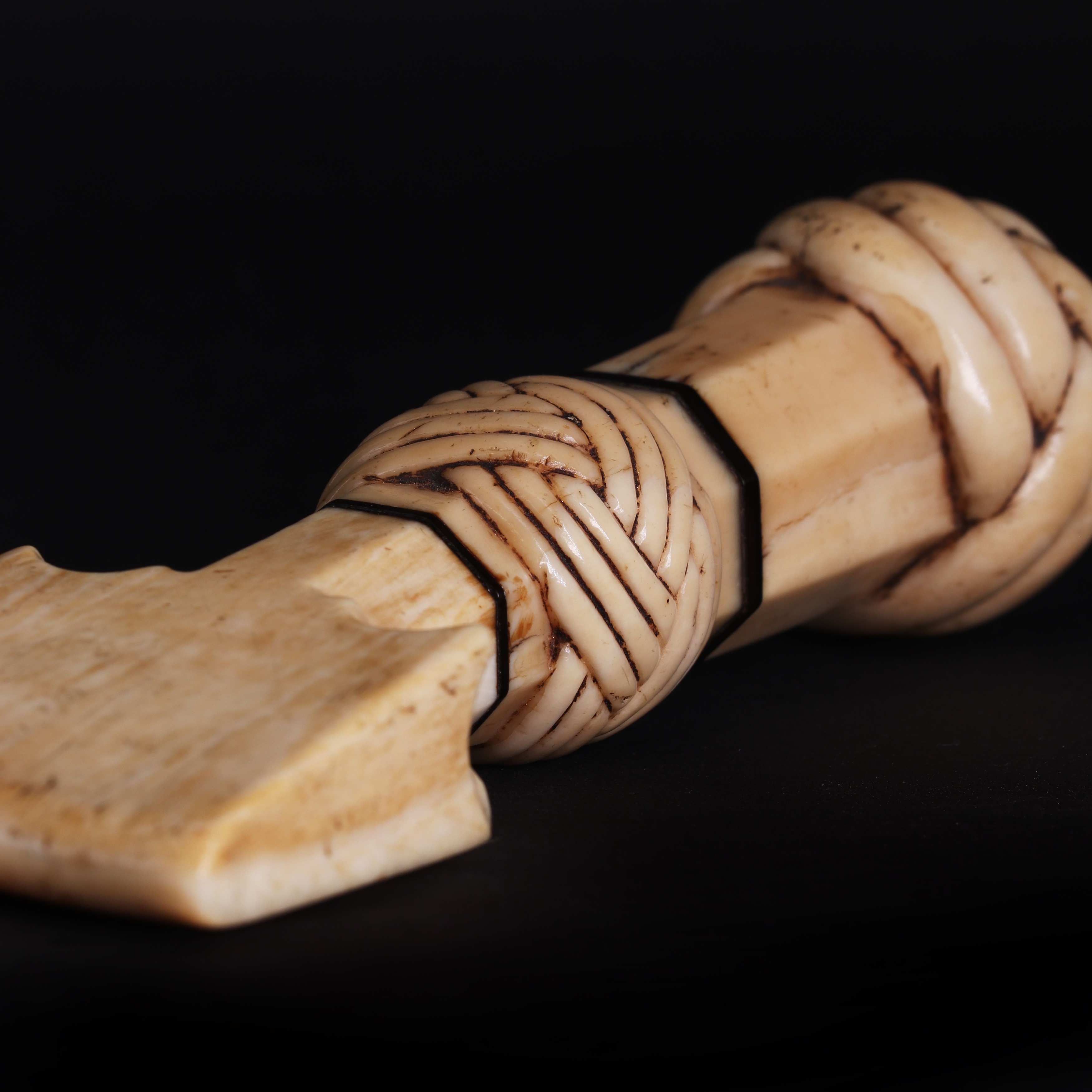 Lot 93 - A sailor's whale tooth seam rubber,