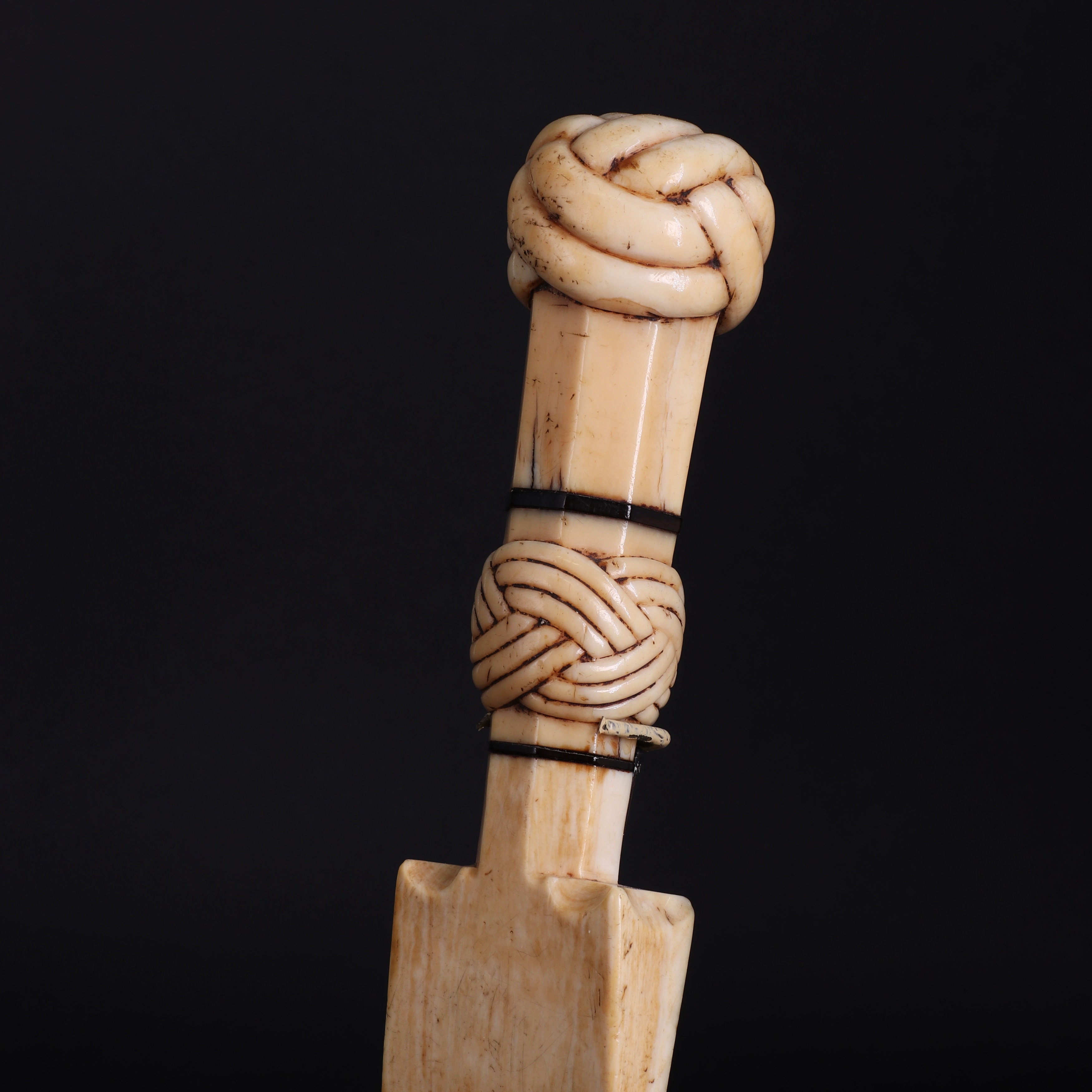 Lot 93 - A sailor's whale tooth seam rubber,