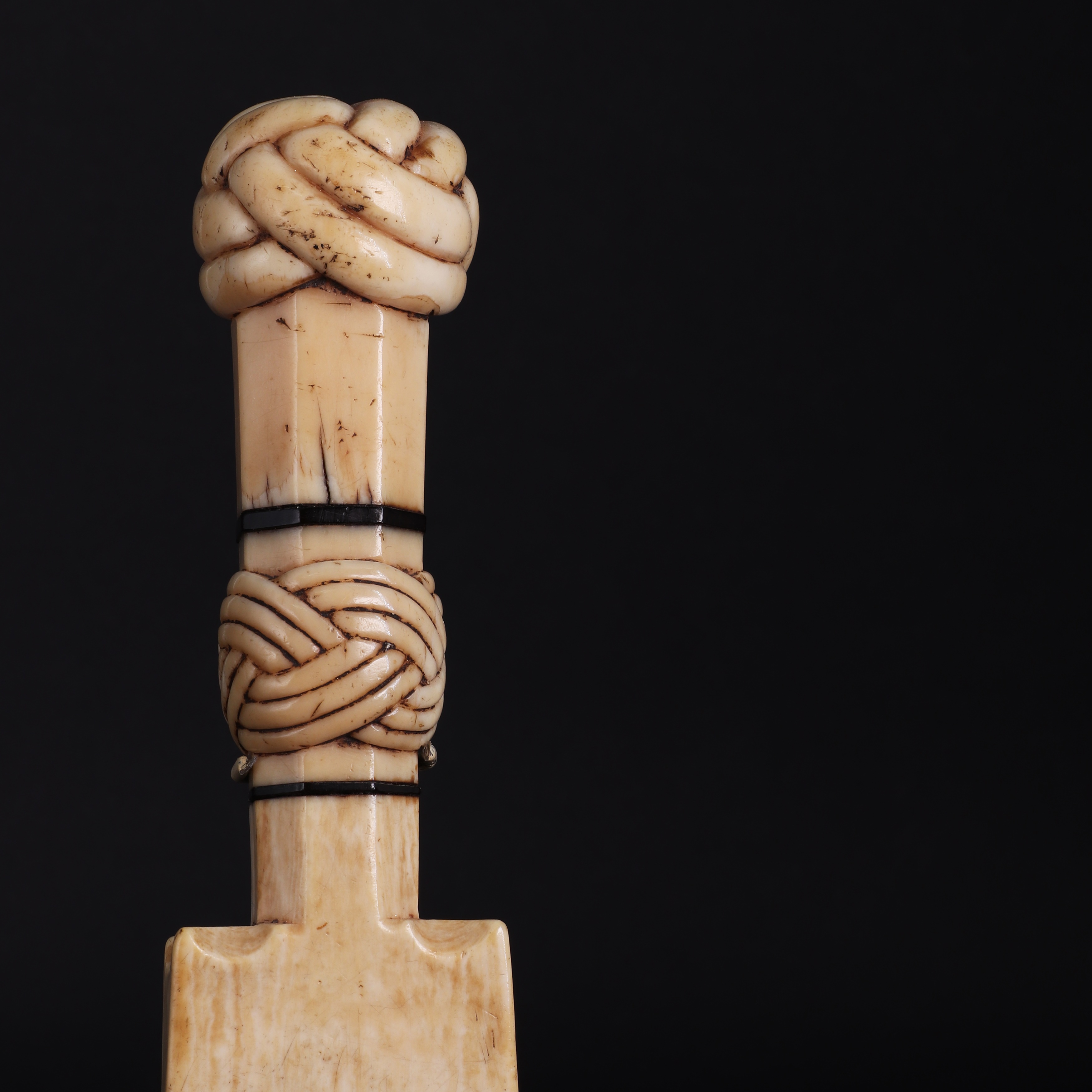 Lot 93 - A sailor's whale tooth seam rubber,