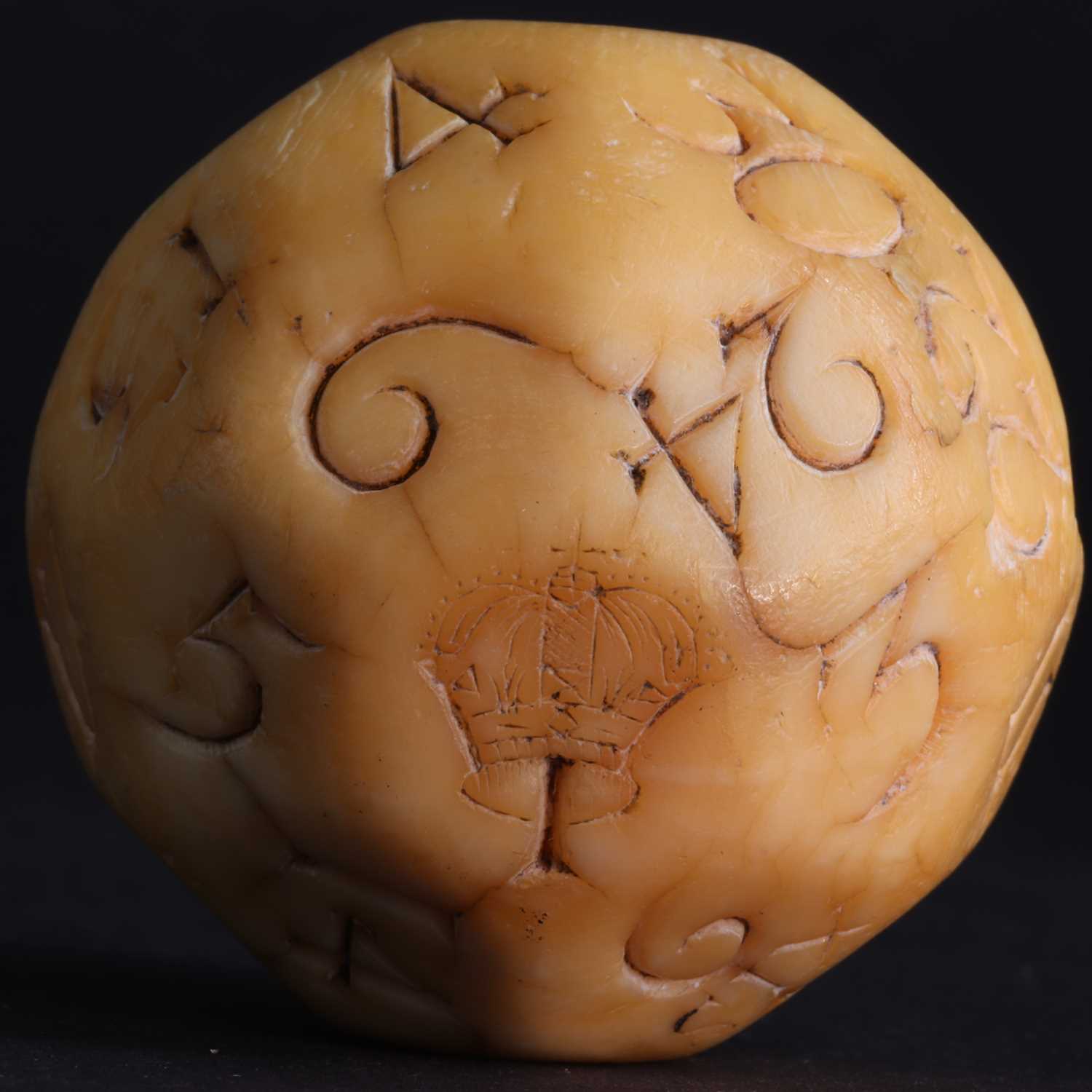 Lot 98 - A rare carved walrus ivory teetotum ball,