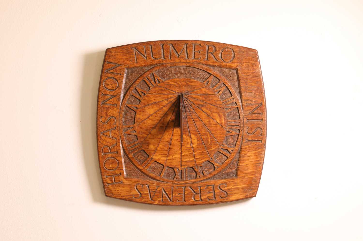 Lot 366 - An Arts and Crafts oak sundial,