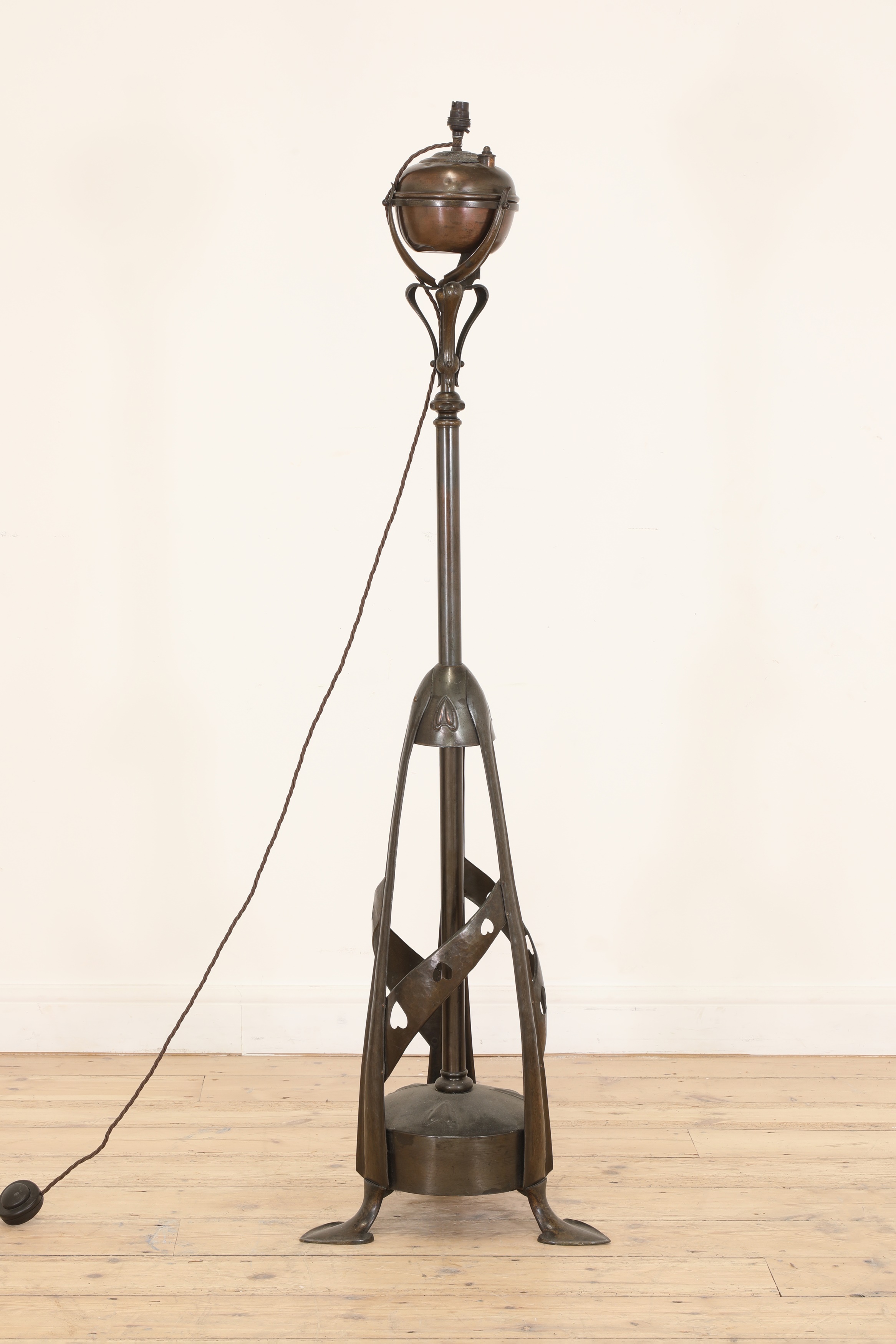 Lot 90 - An Arts and Crafts standard lamp,