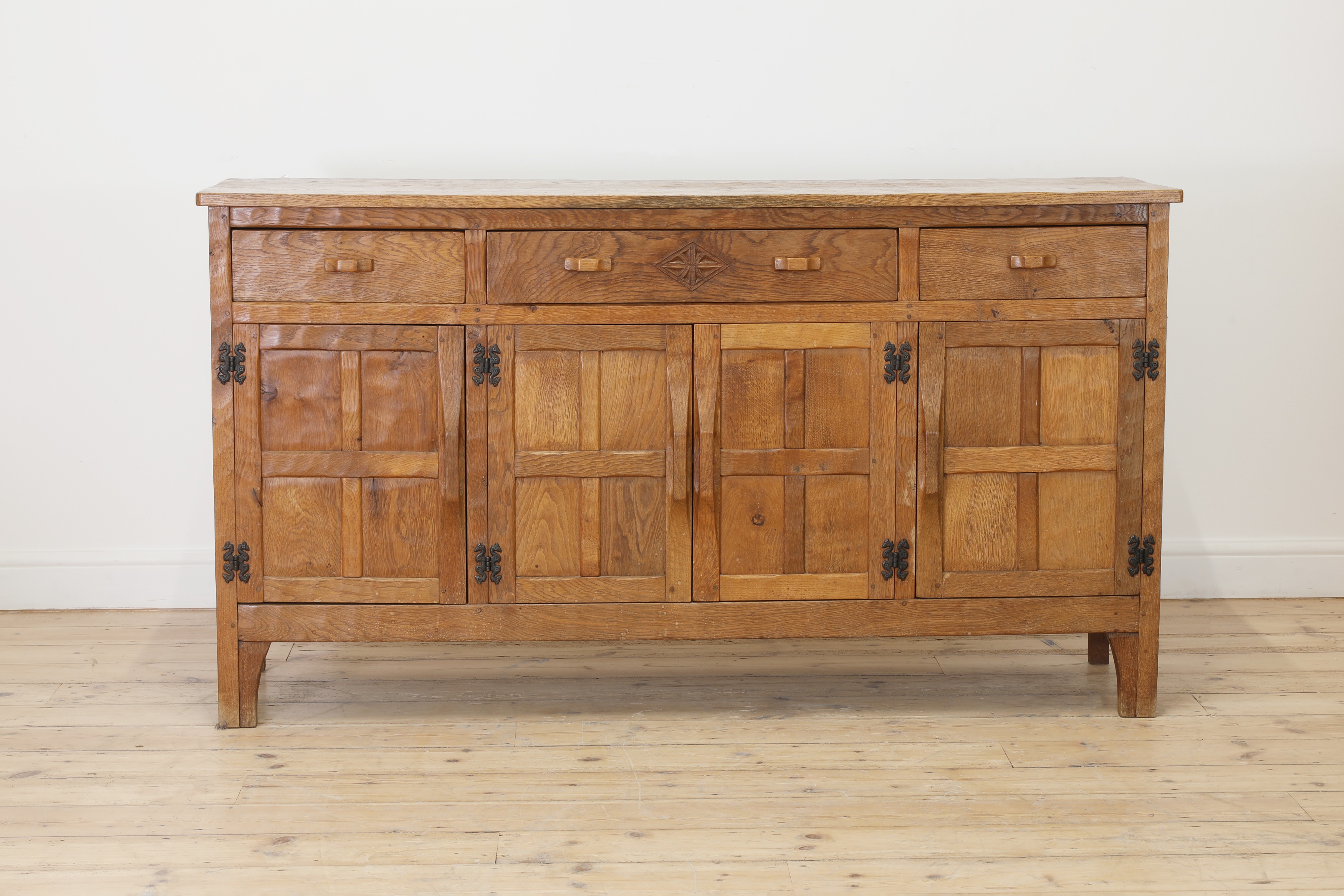 Lot 121 - A Yorkshire School oak sideboard,