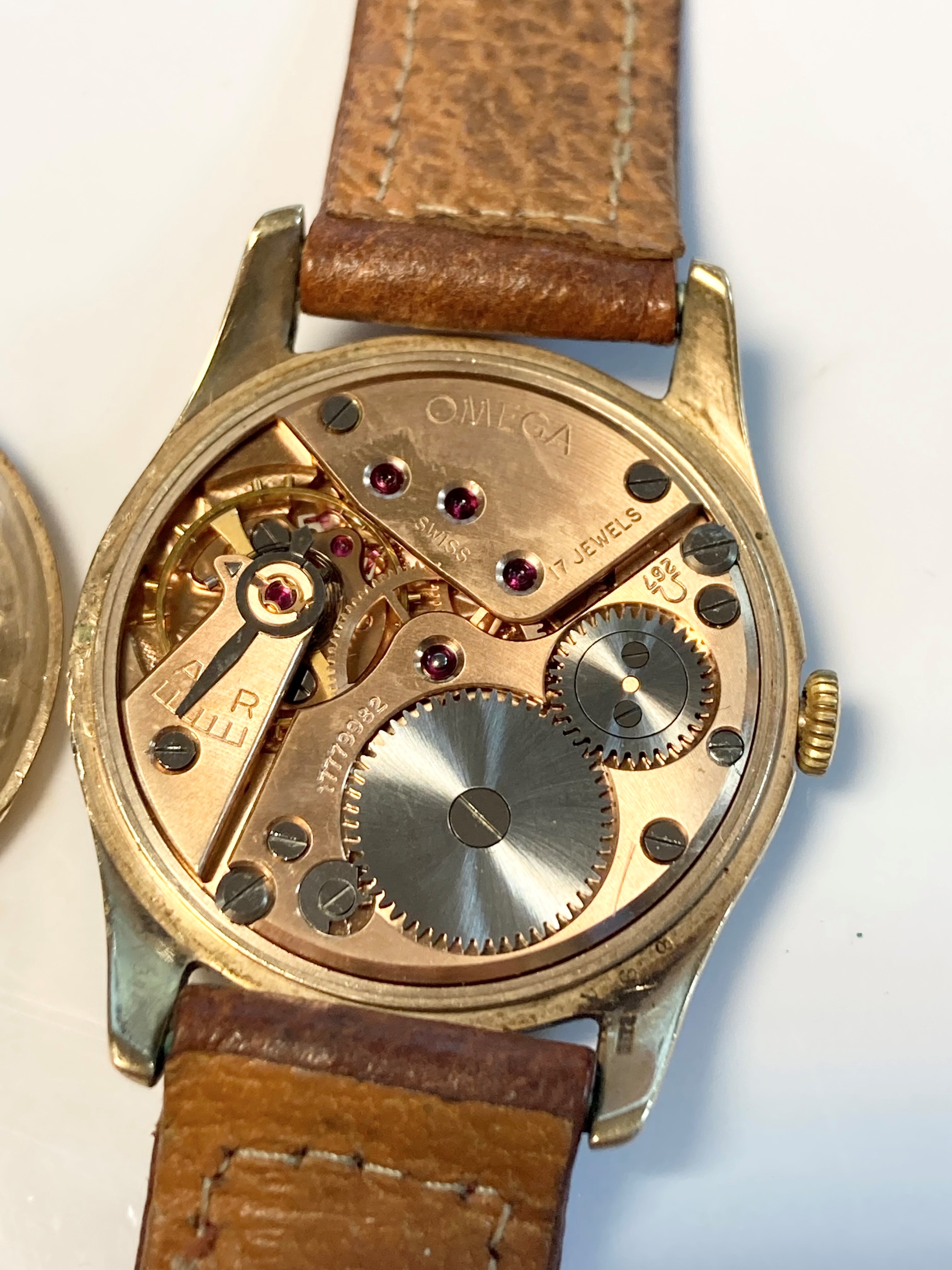 Lot 1436 - A 9ct gold Omega mechanical strap watch,