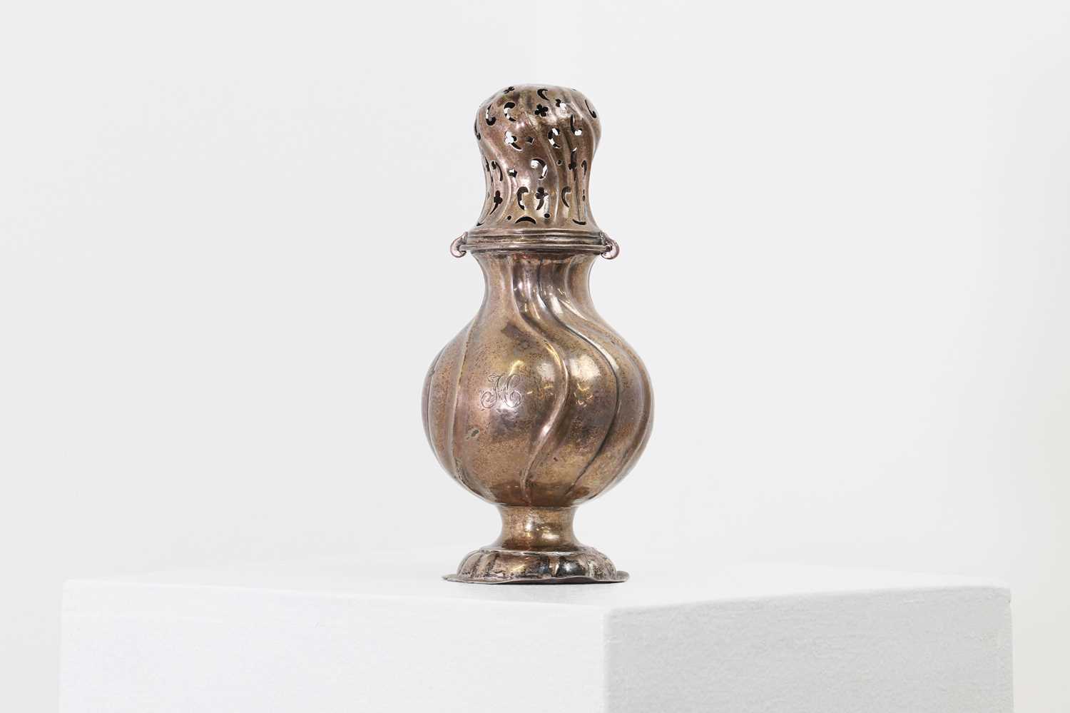 Lot 32 - A silver caster,