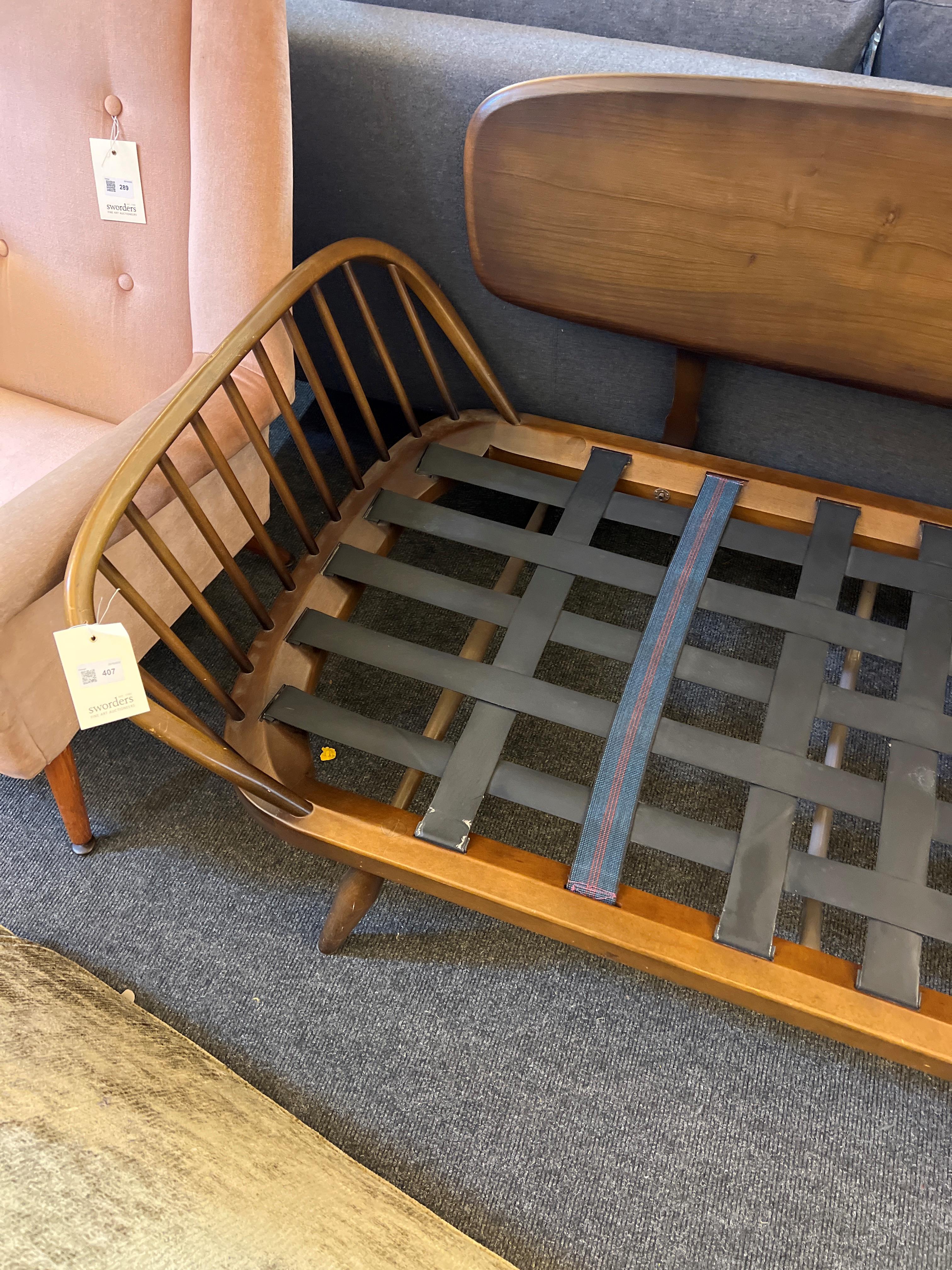 Lot 407 - An Ercol 'Model 355 Studio' daybed,