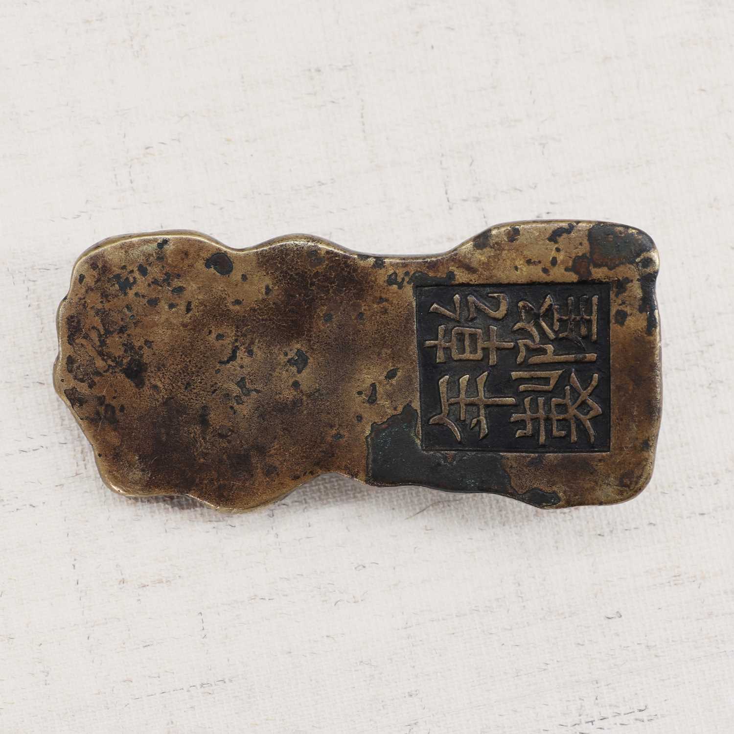Lot 220 - A Chinese bronze ink rest,