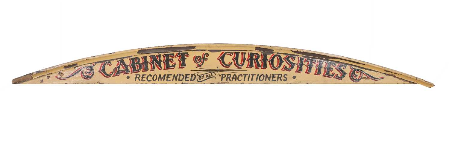 Lot 142 - An arched fairground cornice sign,