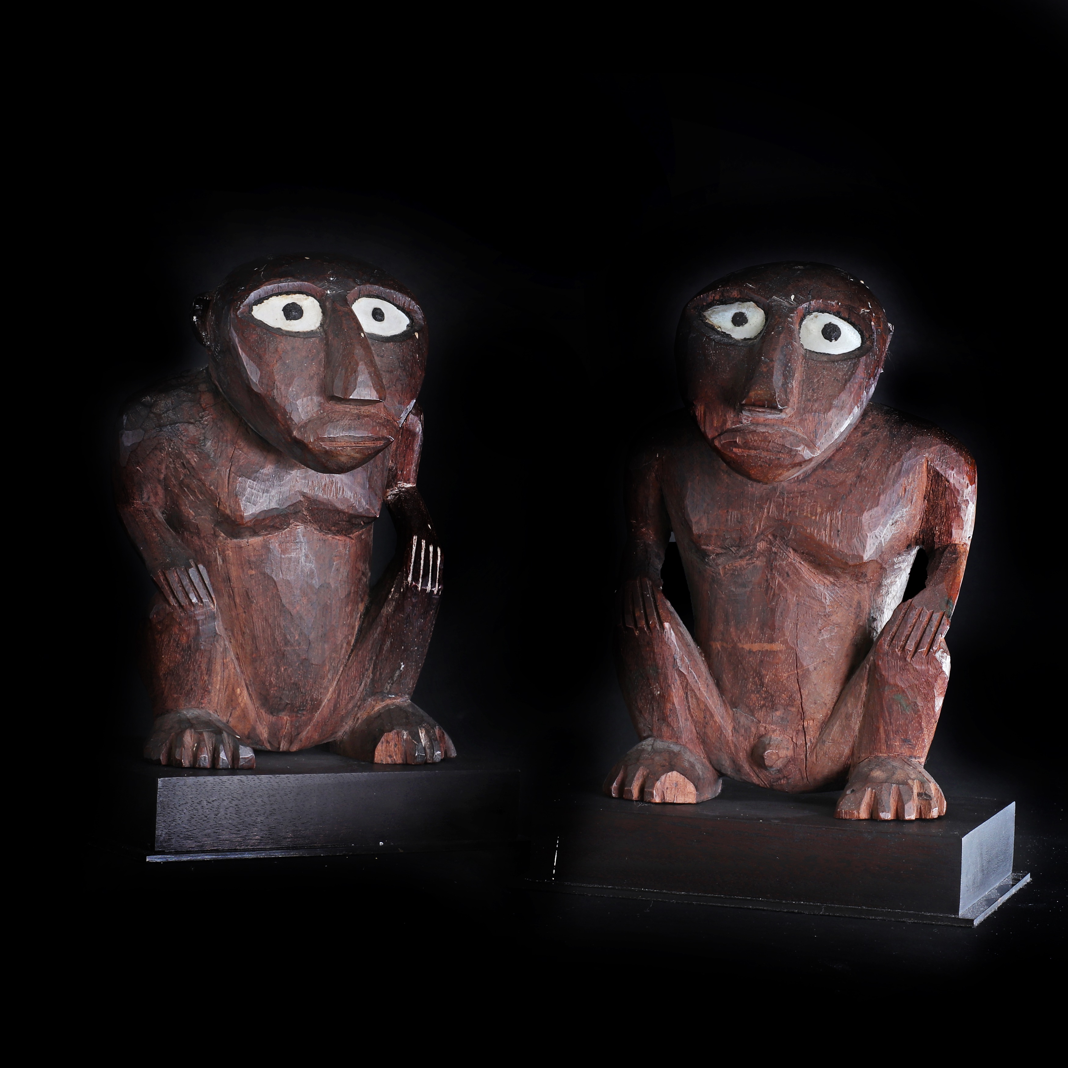 Lot 39 - A rare pair of carved wooden idols,