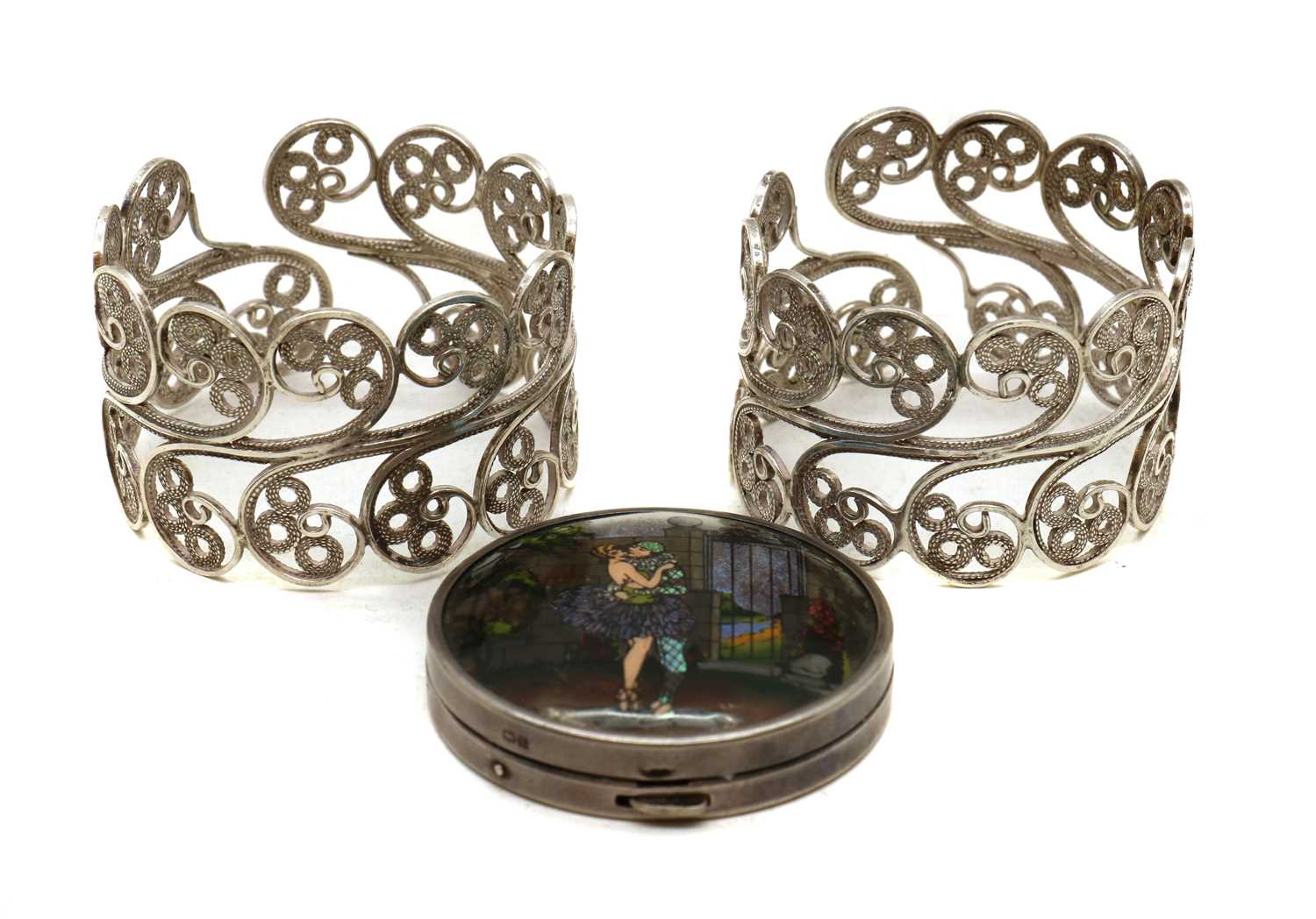 Lot 107 - A small silver compact,