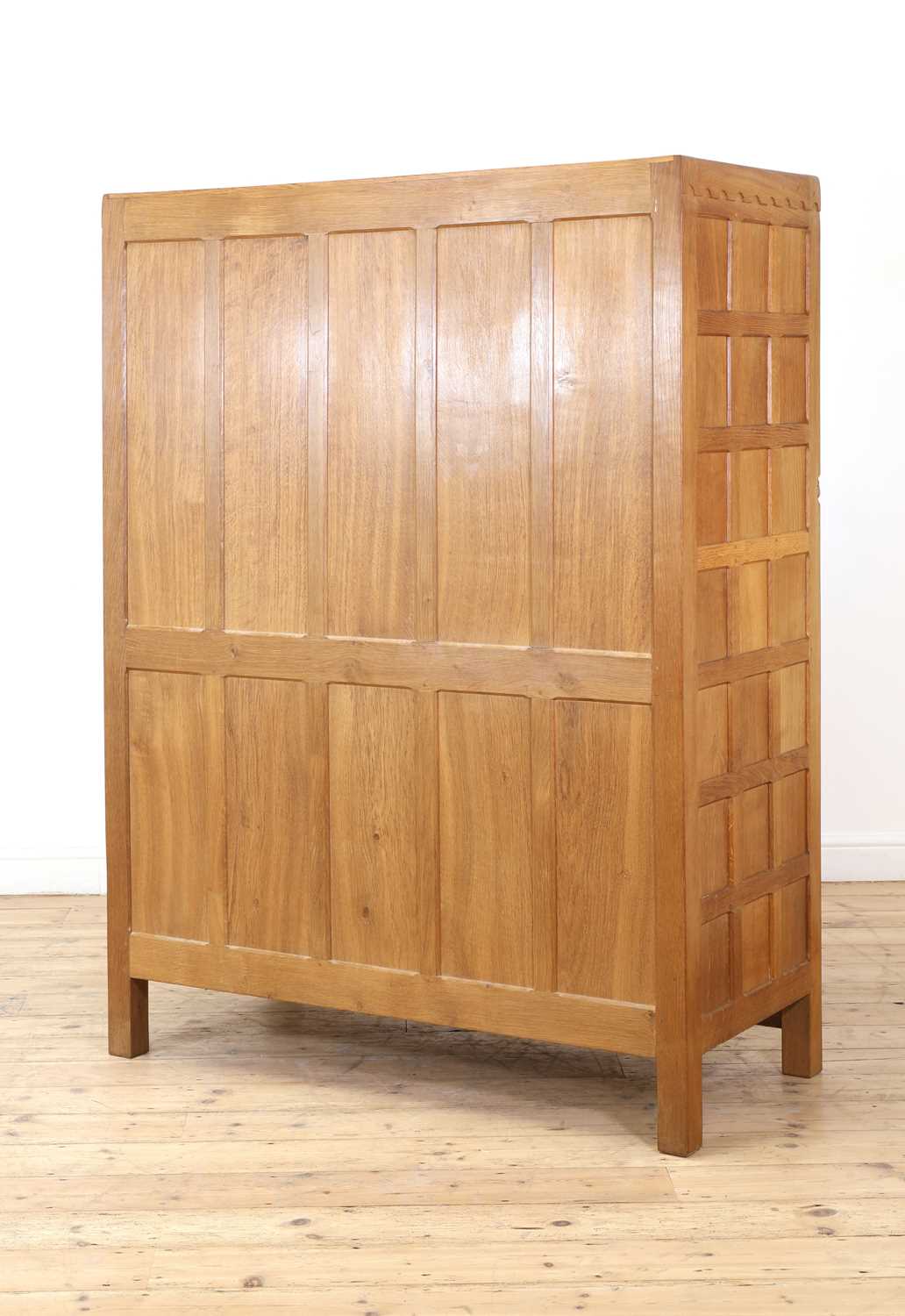 Lot 108 - A Robert 'Mouseman' Thompson panelled oak