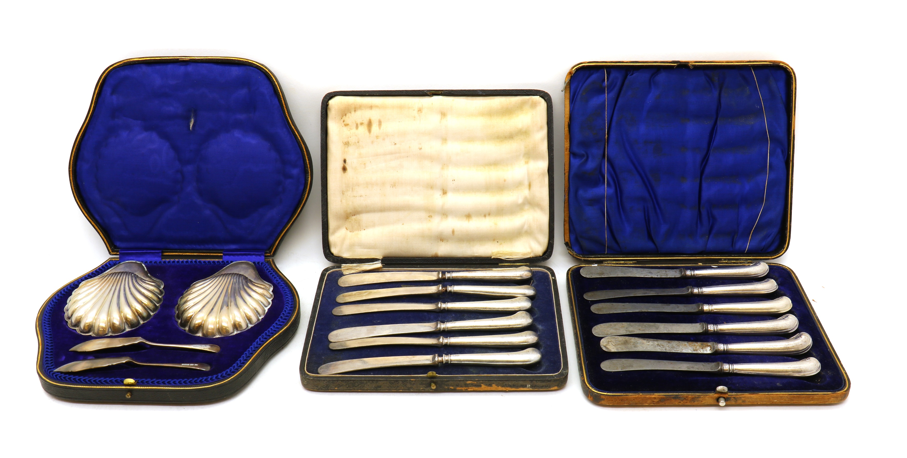 Lot 75 - A cased set of scallop shell butter dishes