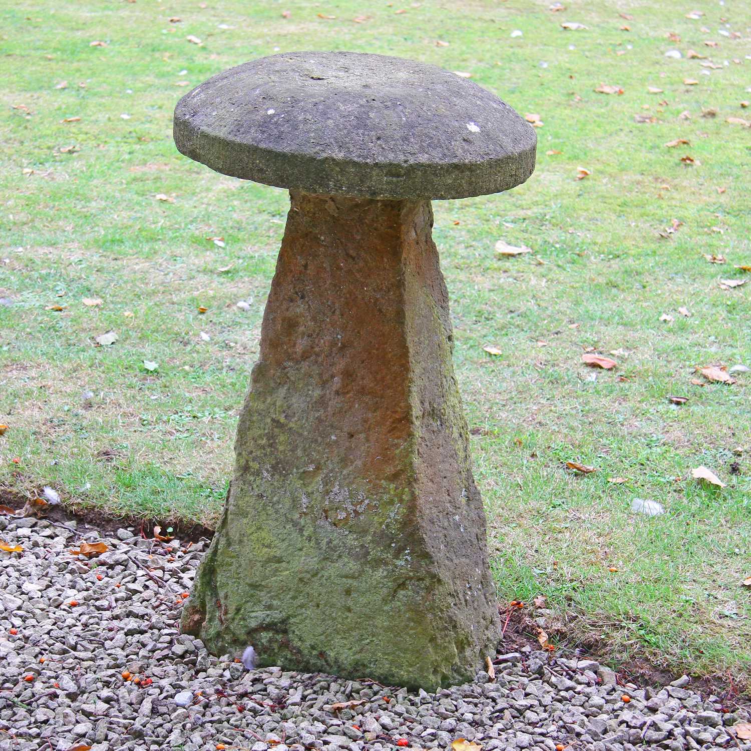 Lot 332 - A sandstone staddle stone,
