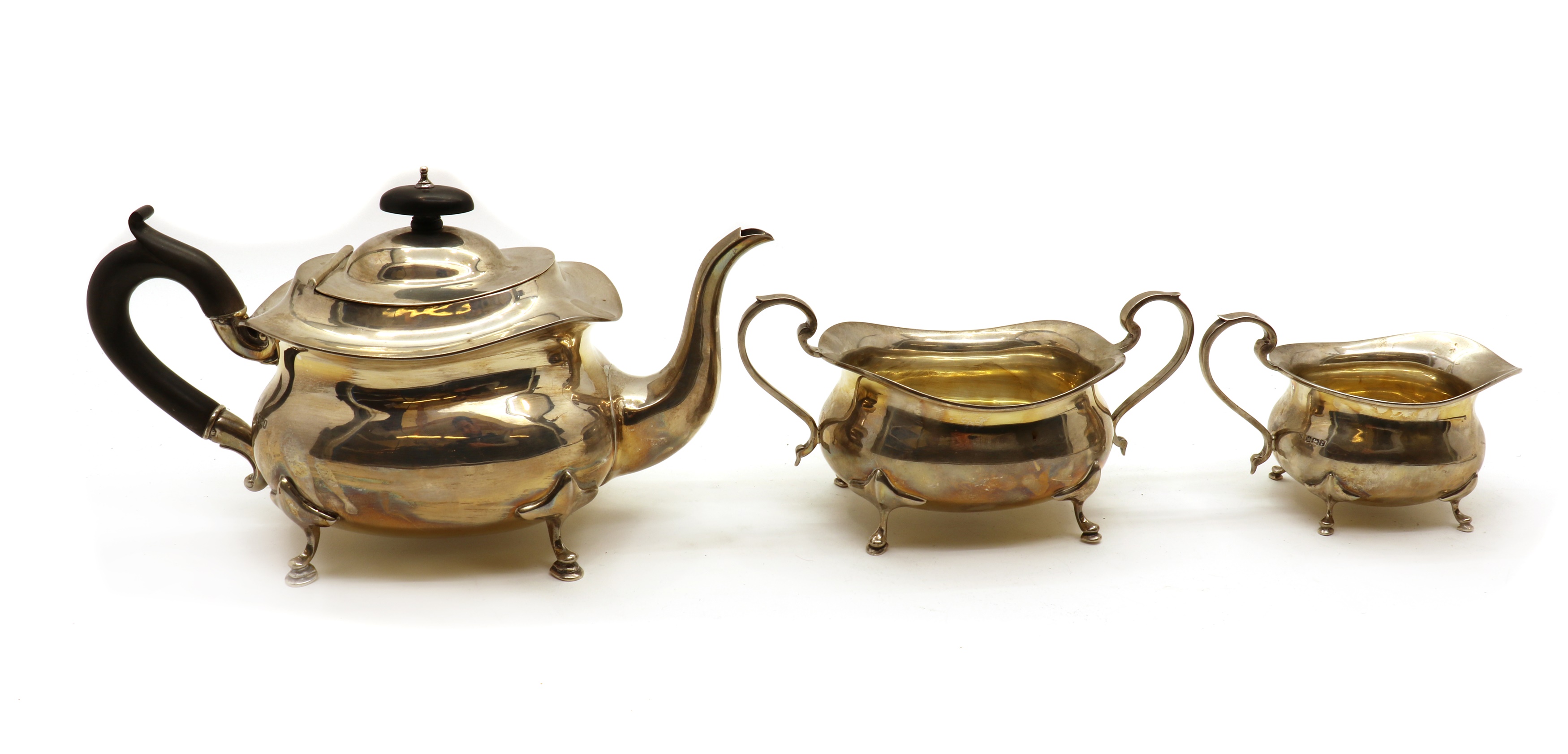 Lot 1 - A silver three piece silver tea service