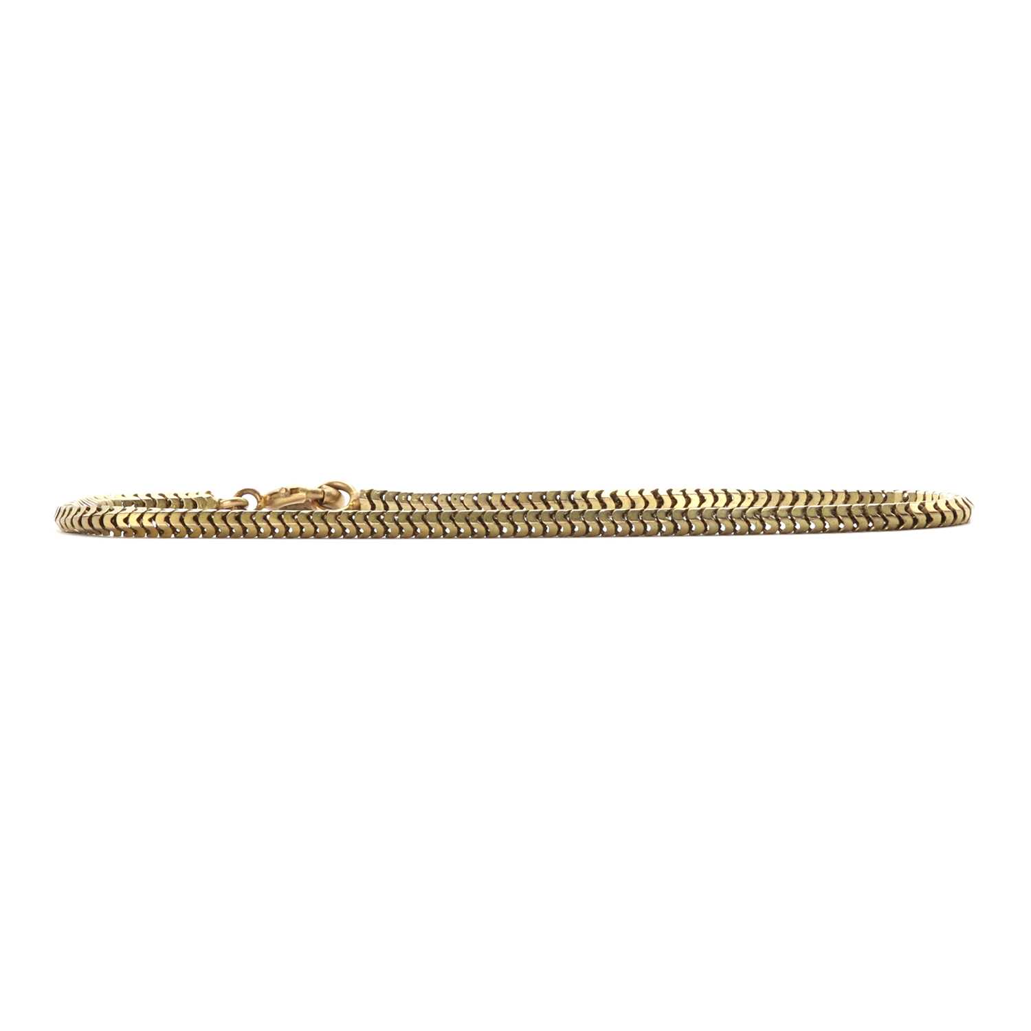Lot 1062 - A gold Brazilian snake chain bracelet,