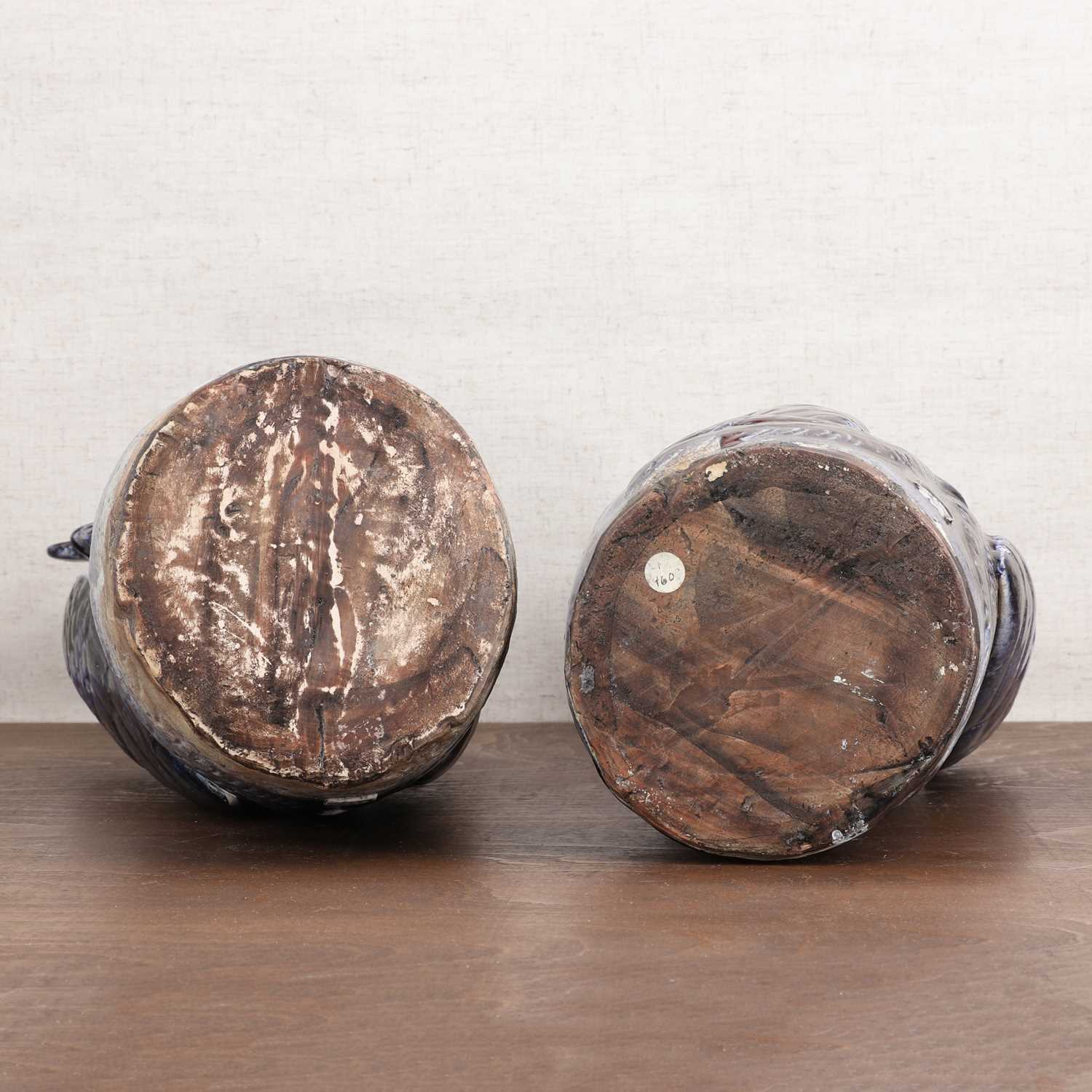 Lot 180 - A pair of large Chinese Shiwan ware figures,