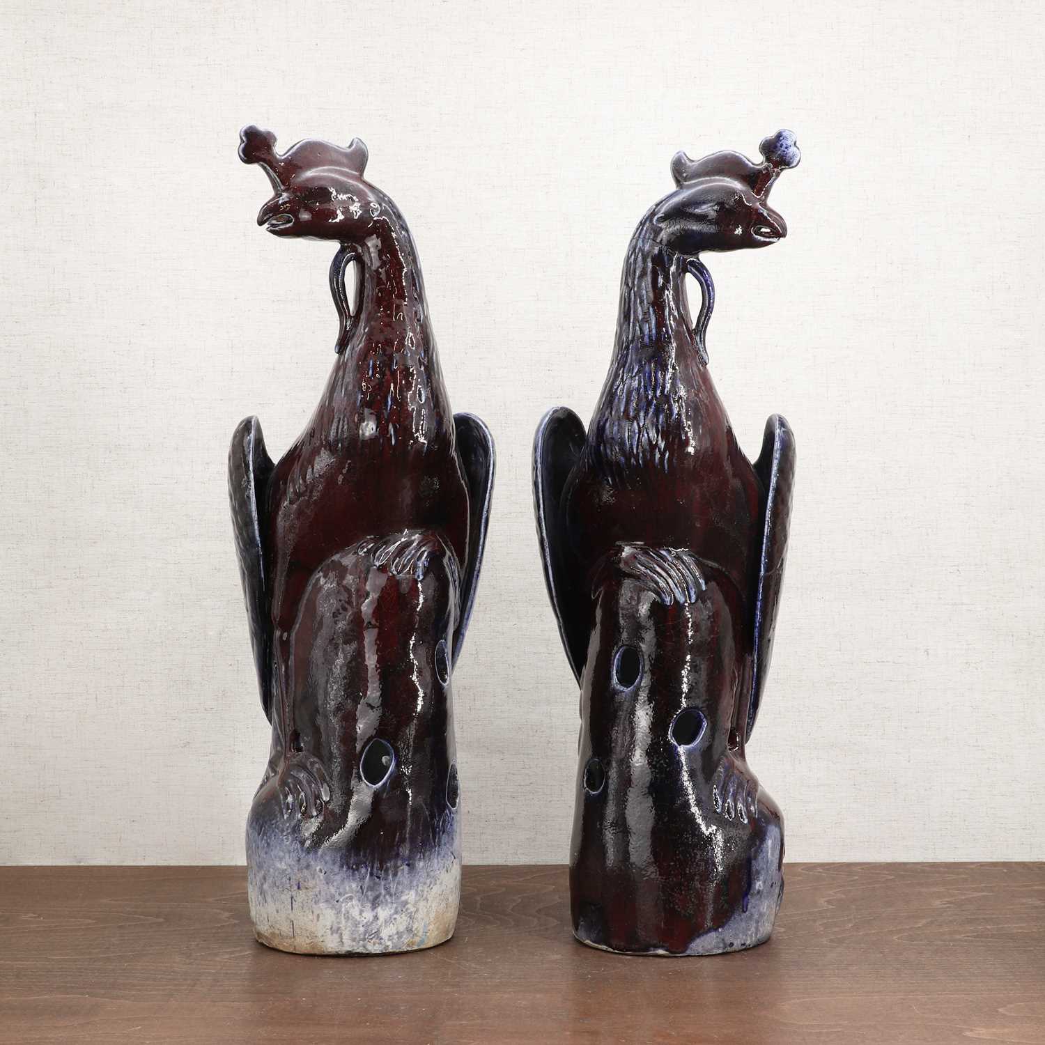 Lot 180 - A pair of large Chinese Shiwan ware figures,