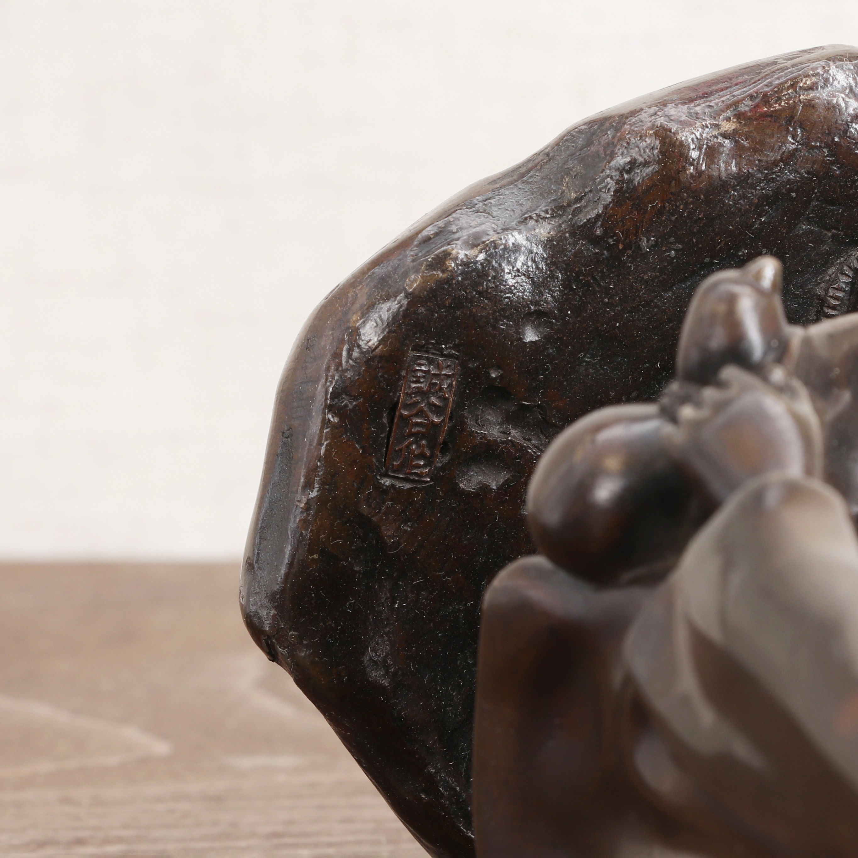 Lot 271 - A Japanese bronze okimono,