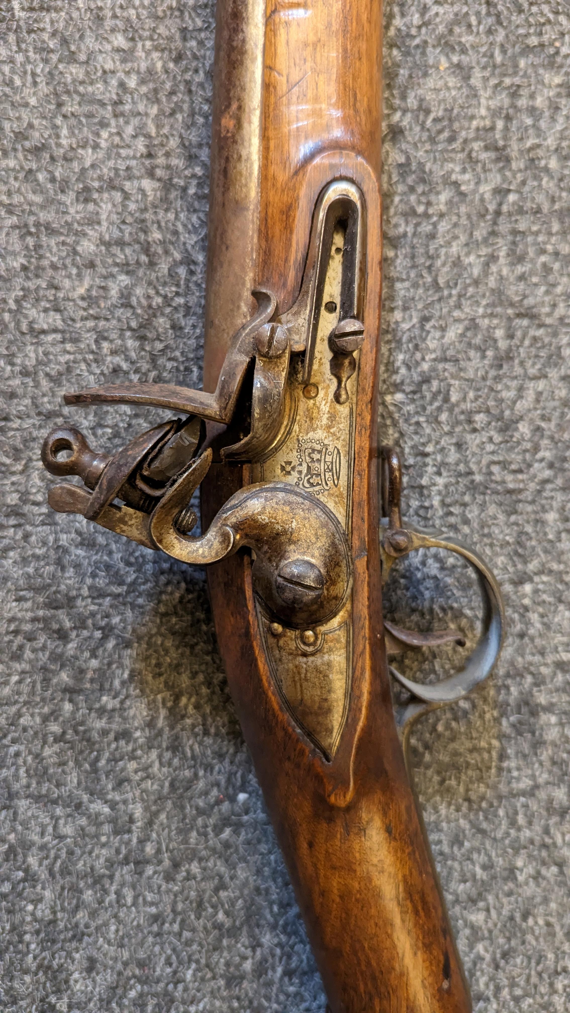 Lot 104 - A Flintlock 'Brown Bess' tower musket with