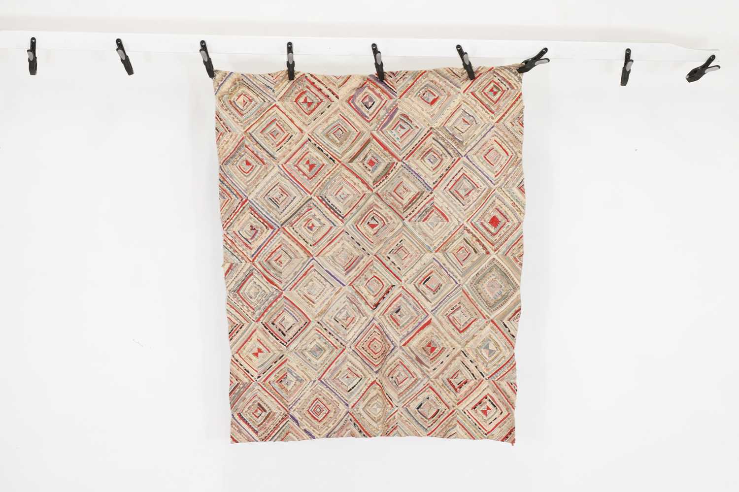 Lot 407 - A cotton patchwork blanket,