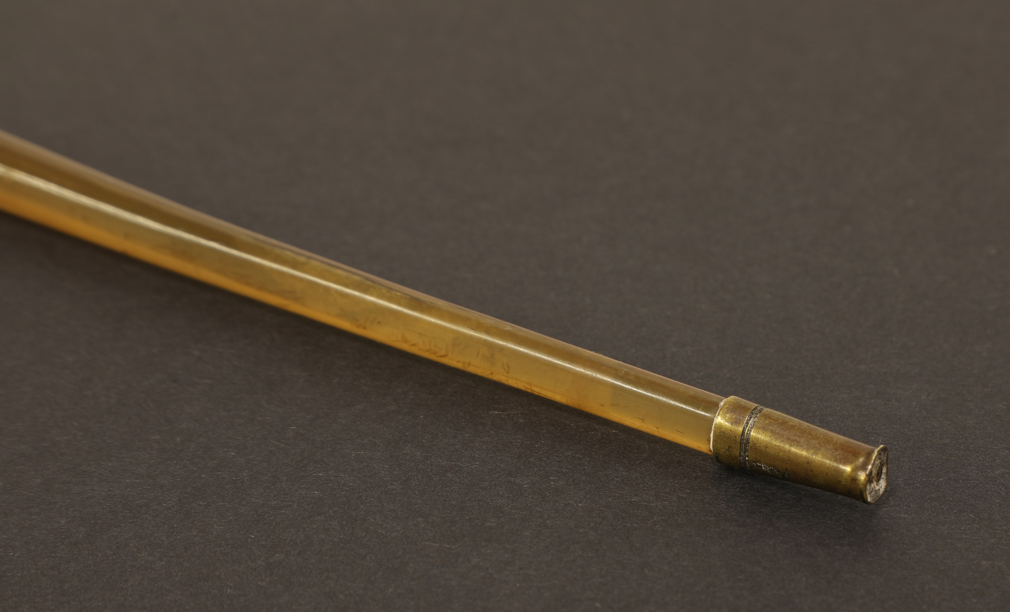 Lot 483 - A silver-mounted rhinoceros horn swagger