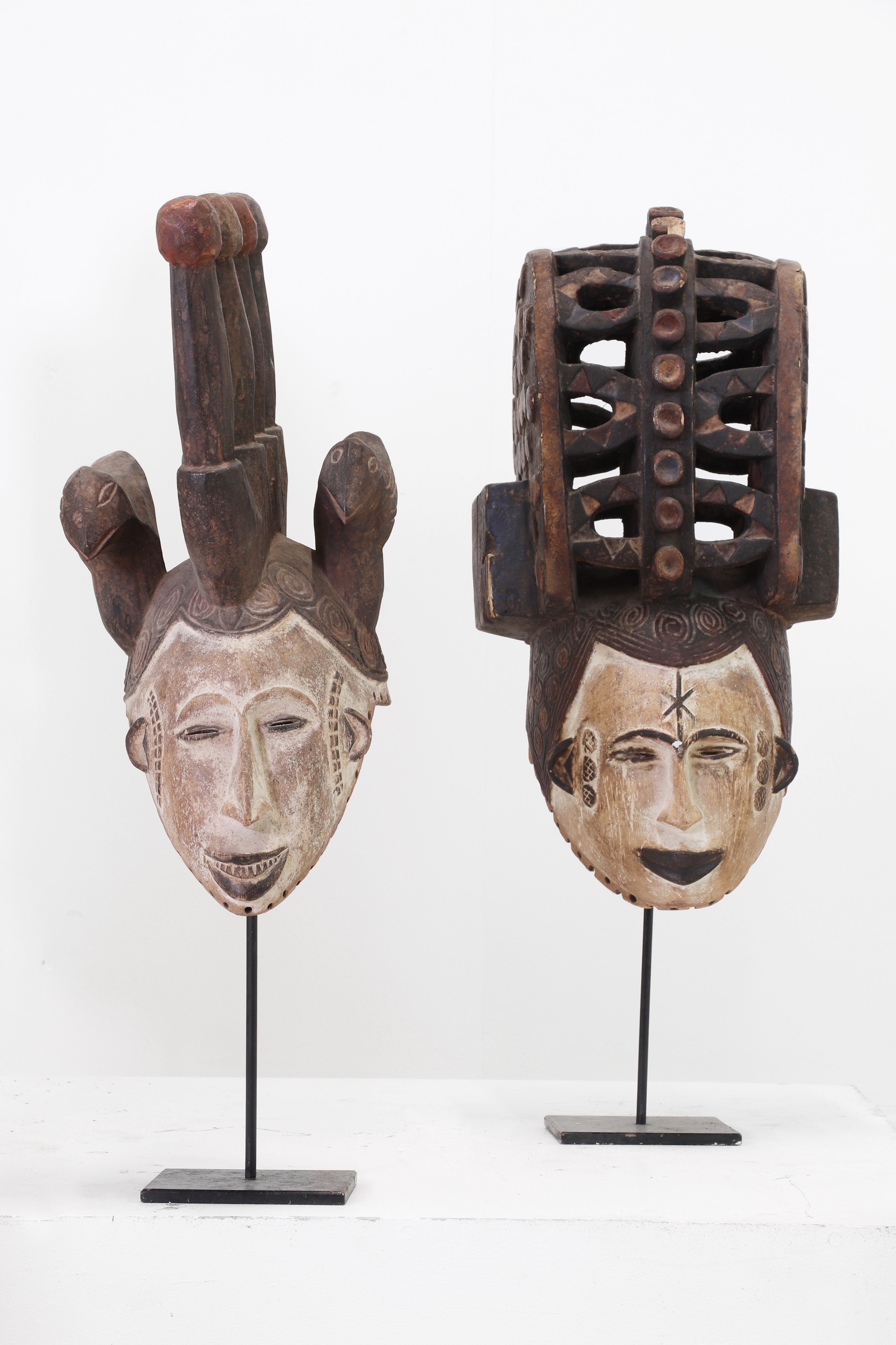 Lot 206 - A set of six carved and painted wooden Igbo