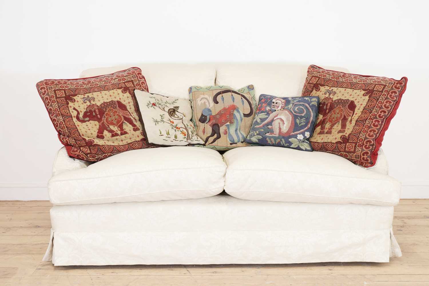 Lot 379 - A group of five cushions,