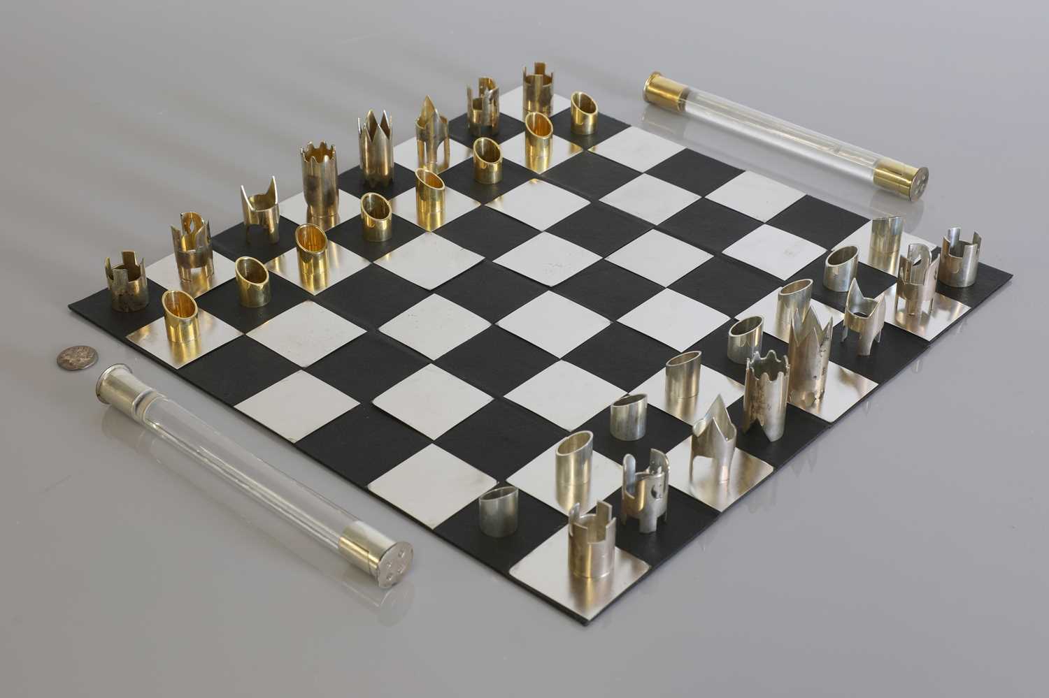 Lot 593 - A silver and silver-gilt chess set,