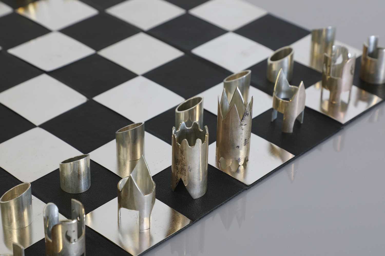 Lot 593 - A silver and silver-gilt chess set,