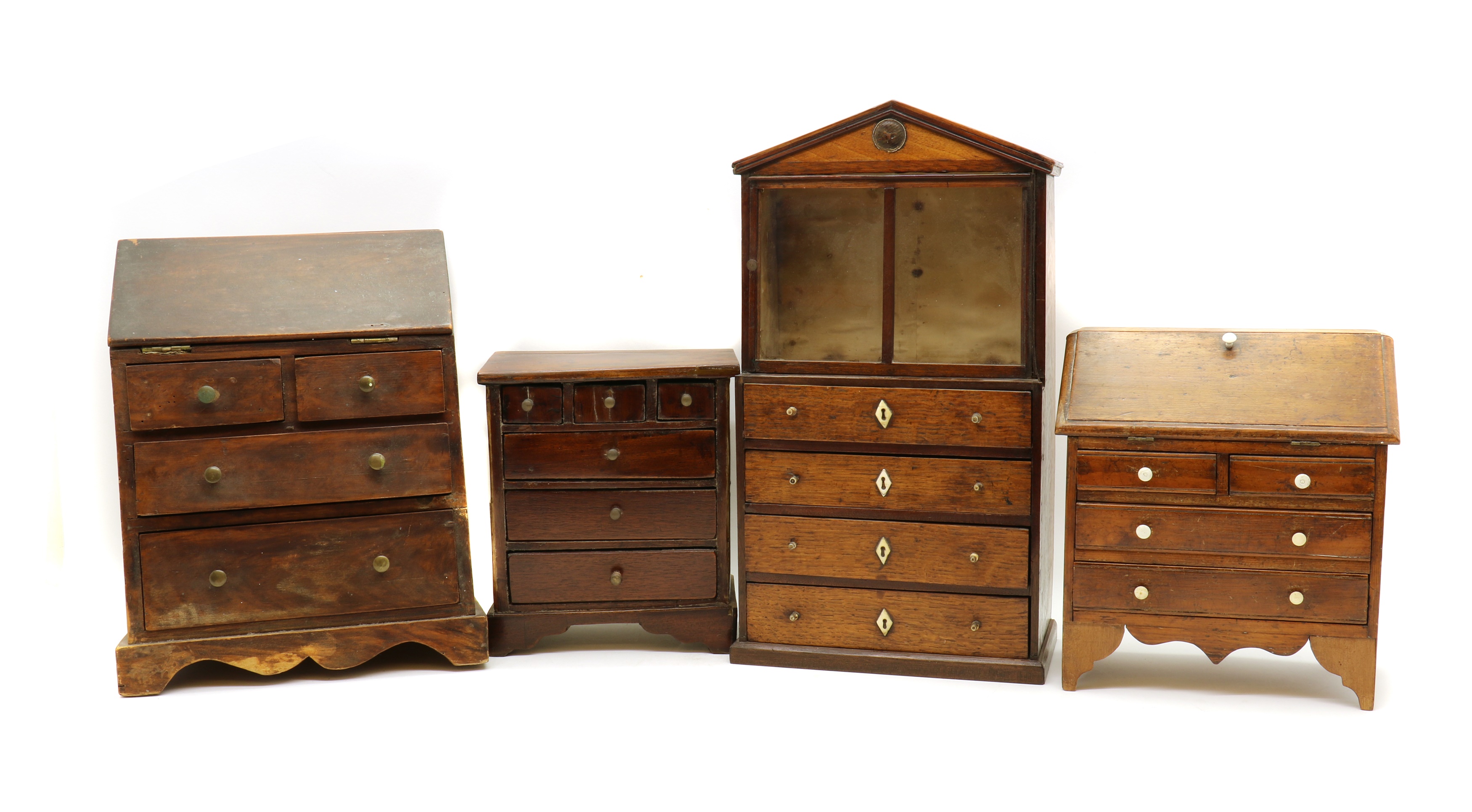 Lot 225 - An oak apprentice piece bookcase,