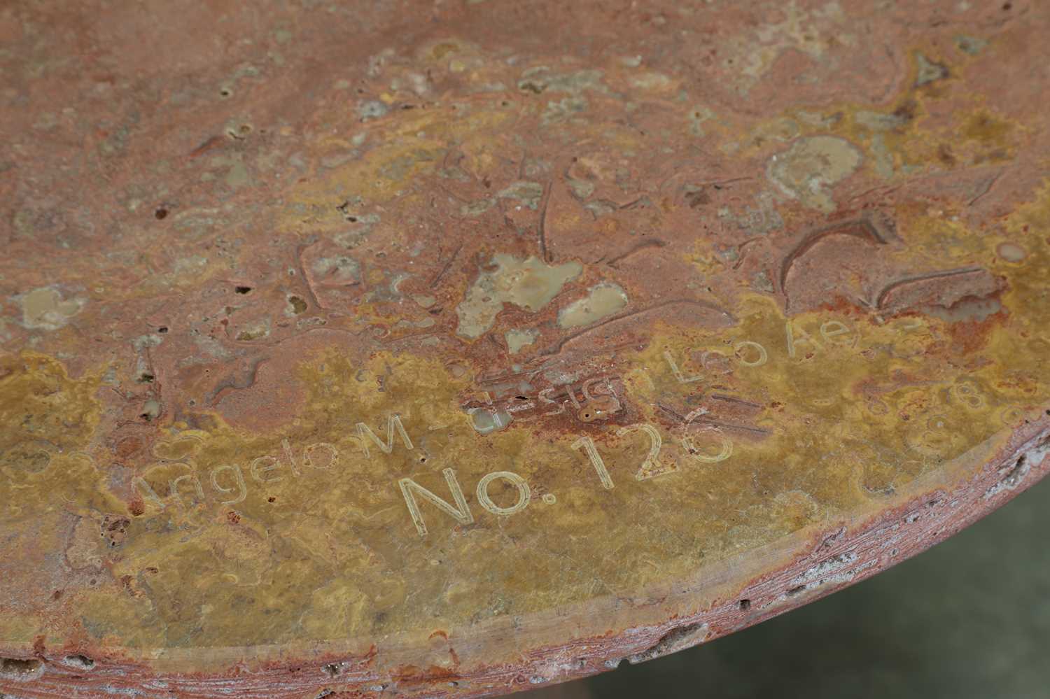 Lot 577 - A Travertine Rosso marble 'Angelo M' table,