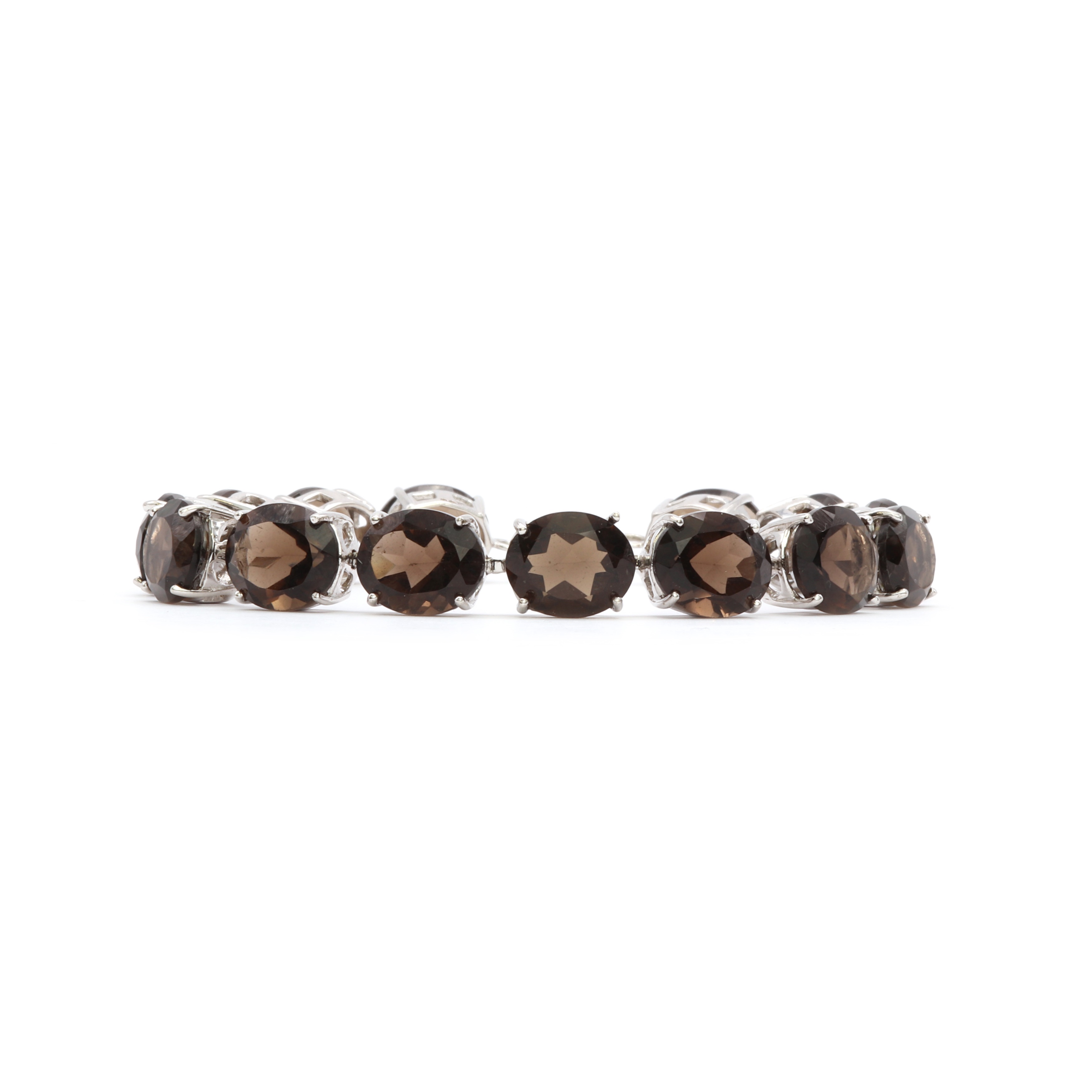 Lot 155 - A silver and smoky quartz bracelet,