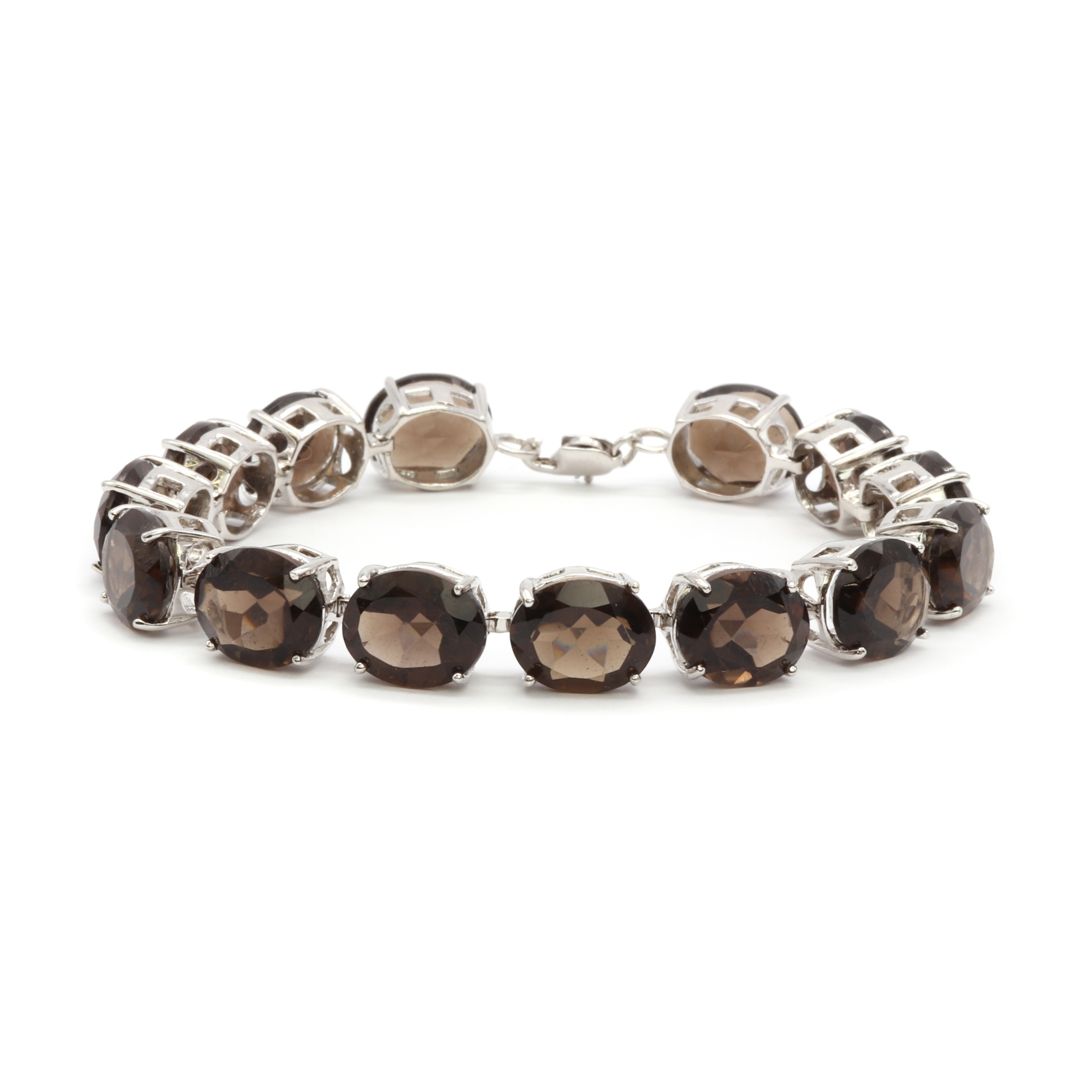 Lot 155 - A silver and smoky quartz bracelet,