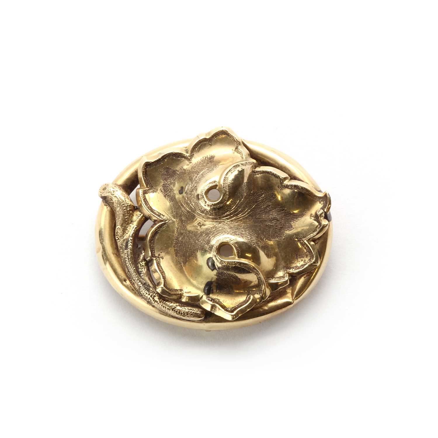 Lot 5 - A gold leaf design brooch,