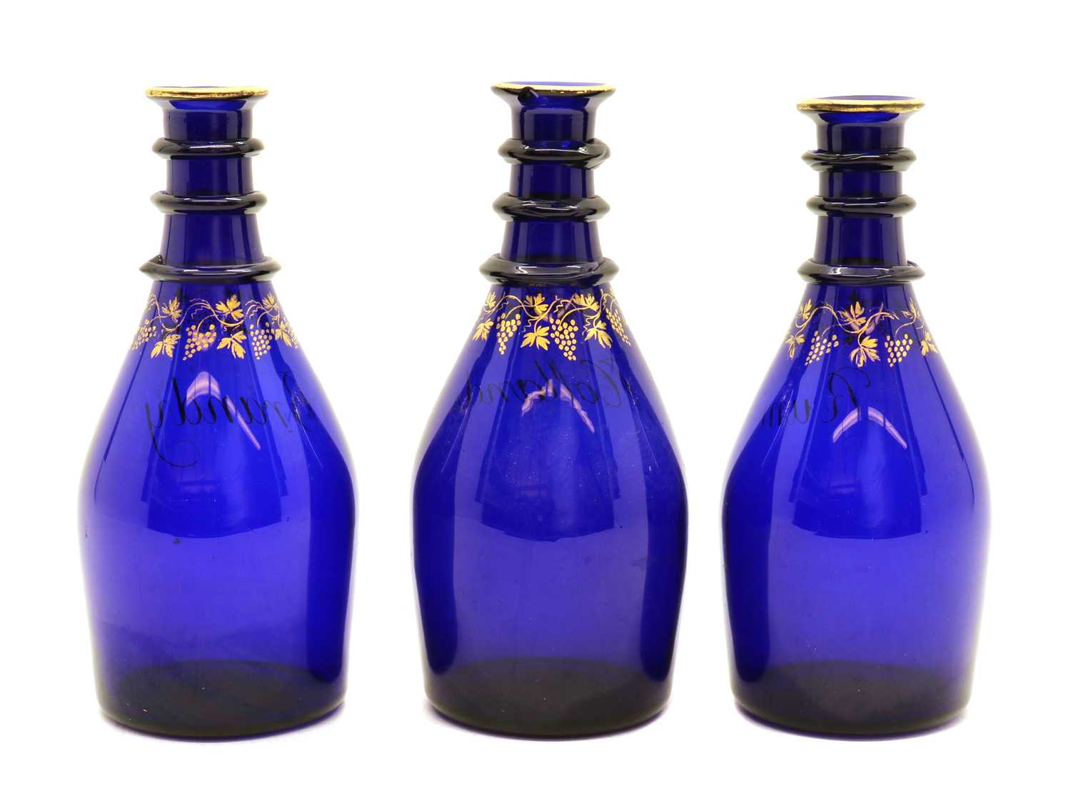 Lot 266 - A set of three Bristol blue Regency glass