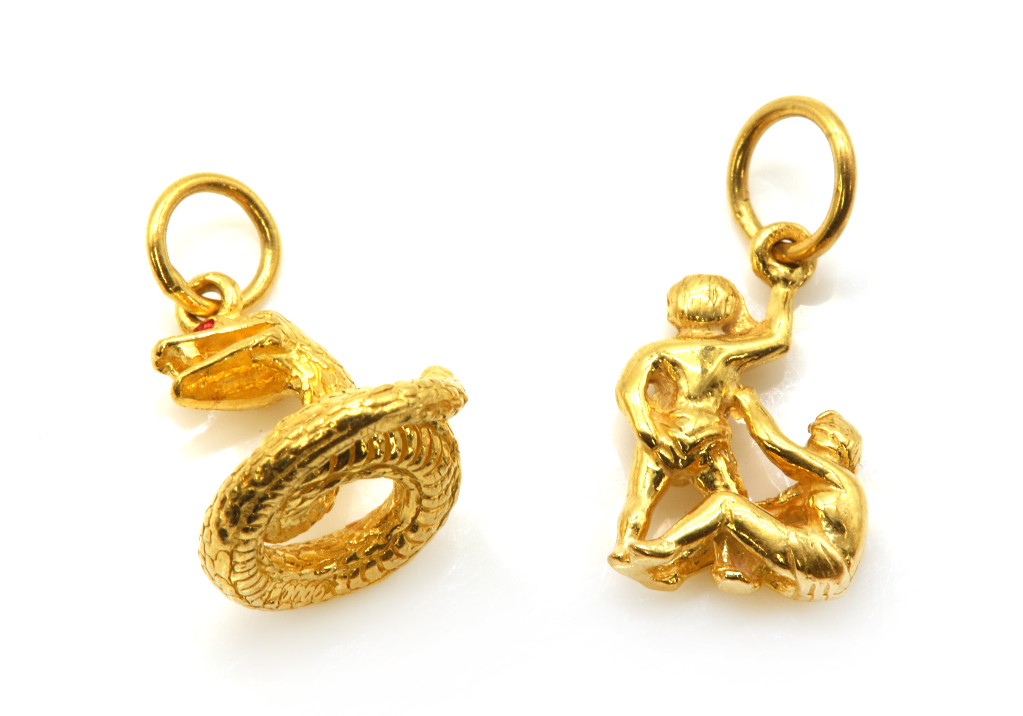 Lot 345 - Two high carat gold charms,