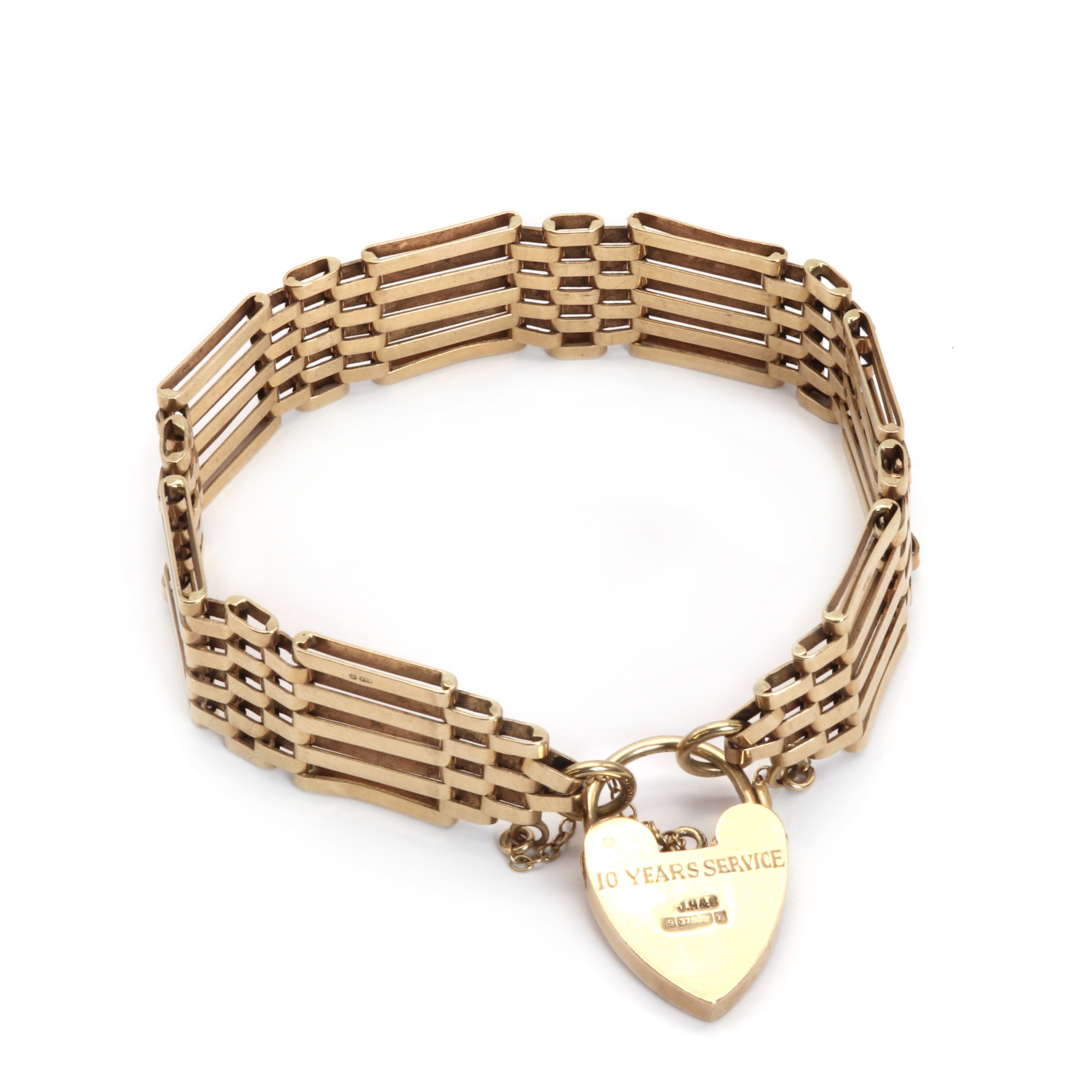 Lot 118 - A 9ct gold gate bracelet,