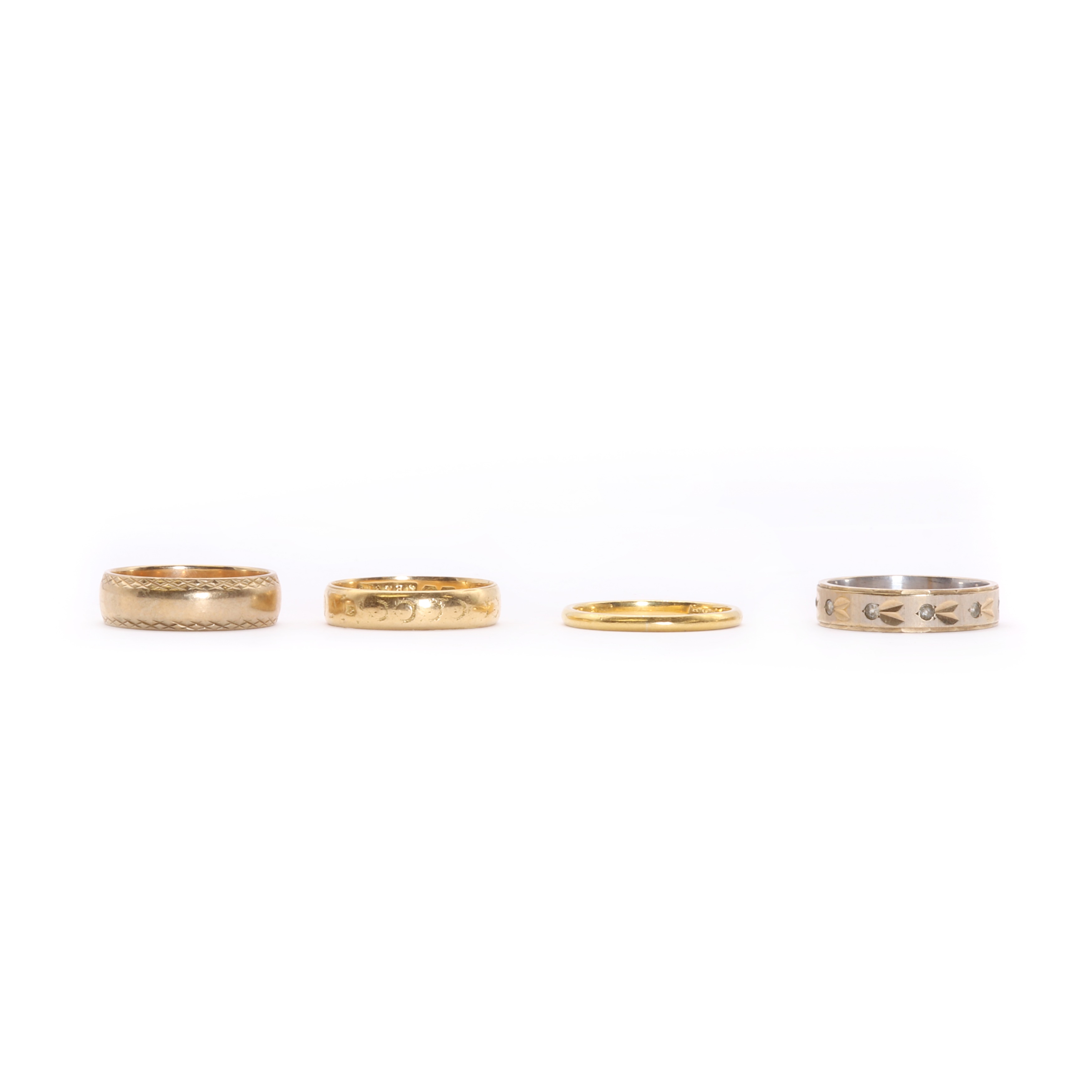 Lot 215 - Four gold wedding rings,