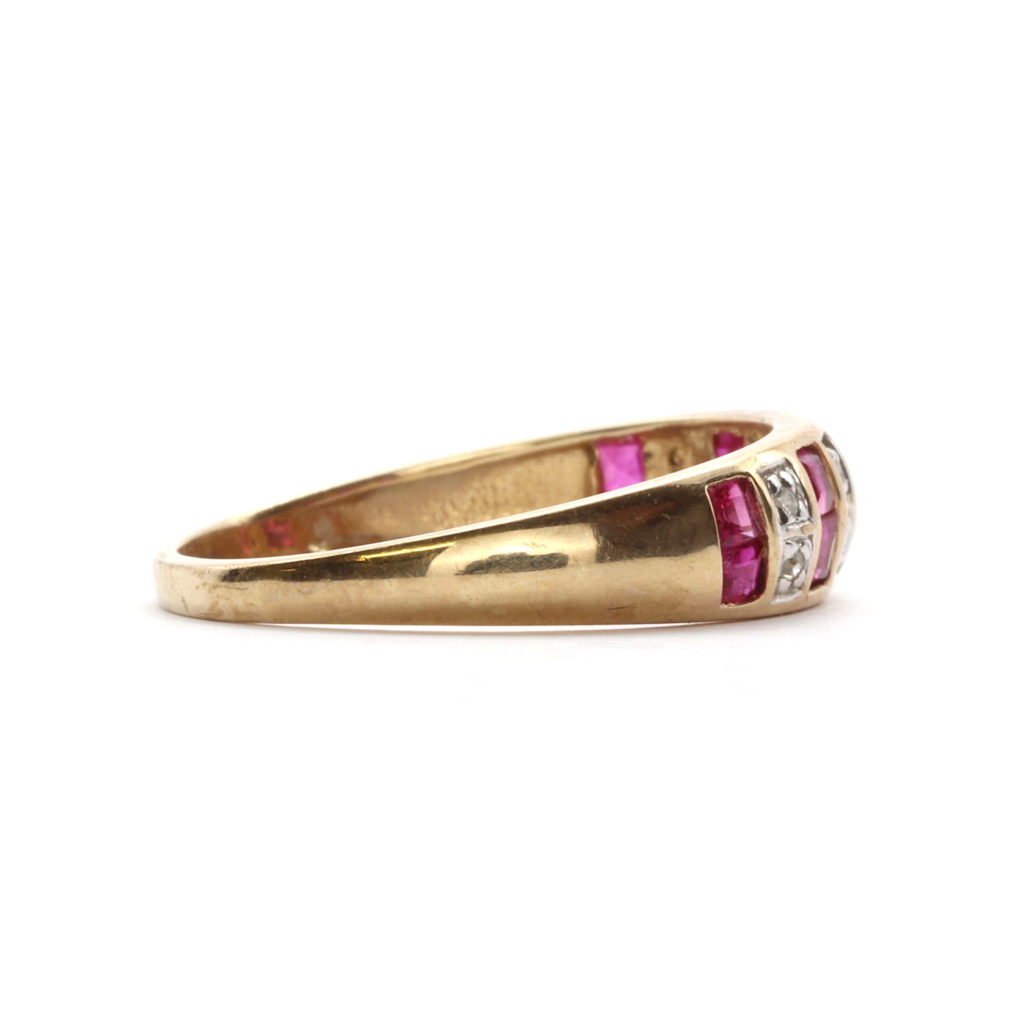 Lot 100 - A 9ct gold ruby and diamond ring,