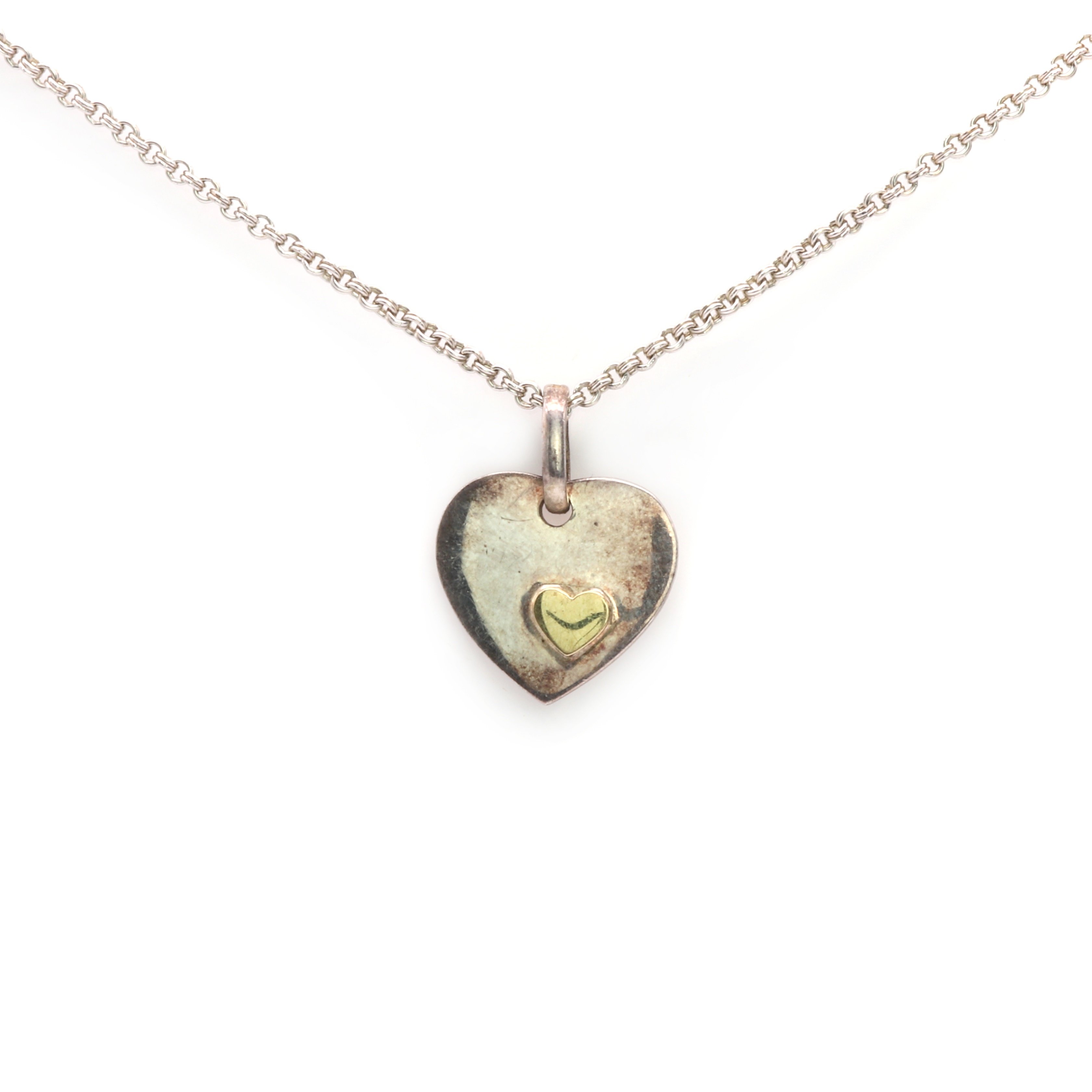 Lot 244 - A silver Links of London heart pendant,