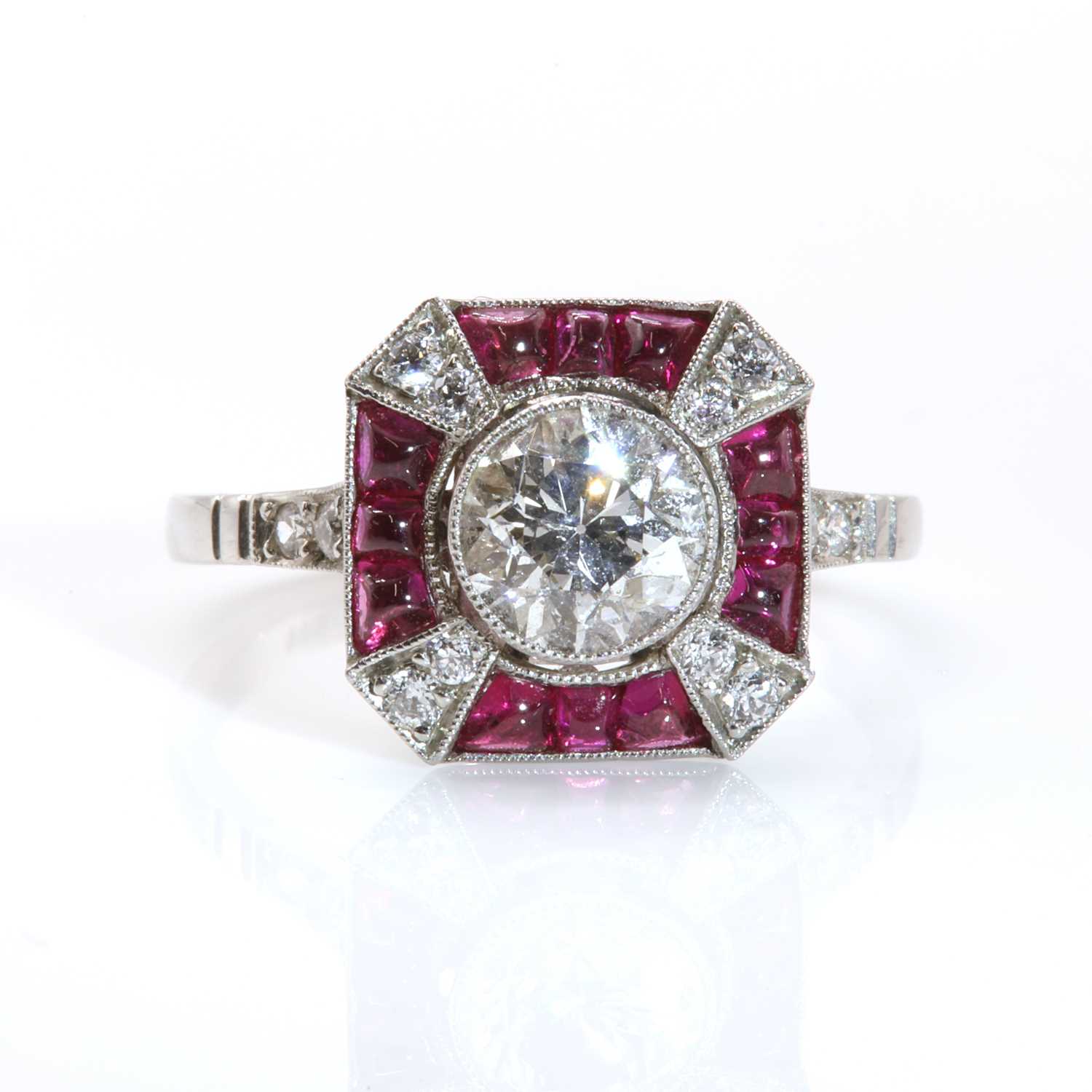 Lot 323 - An Art Deco style diamond and ruby octagonal