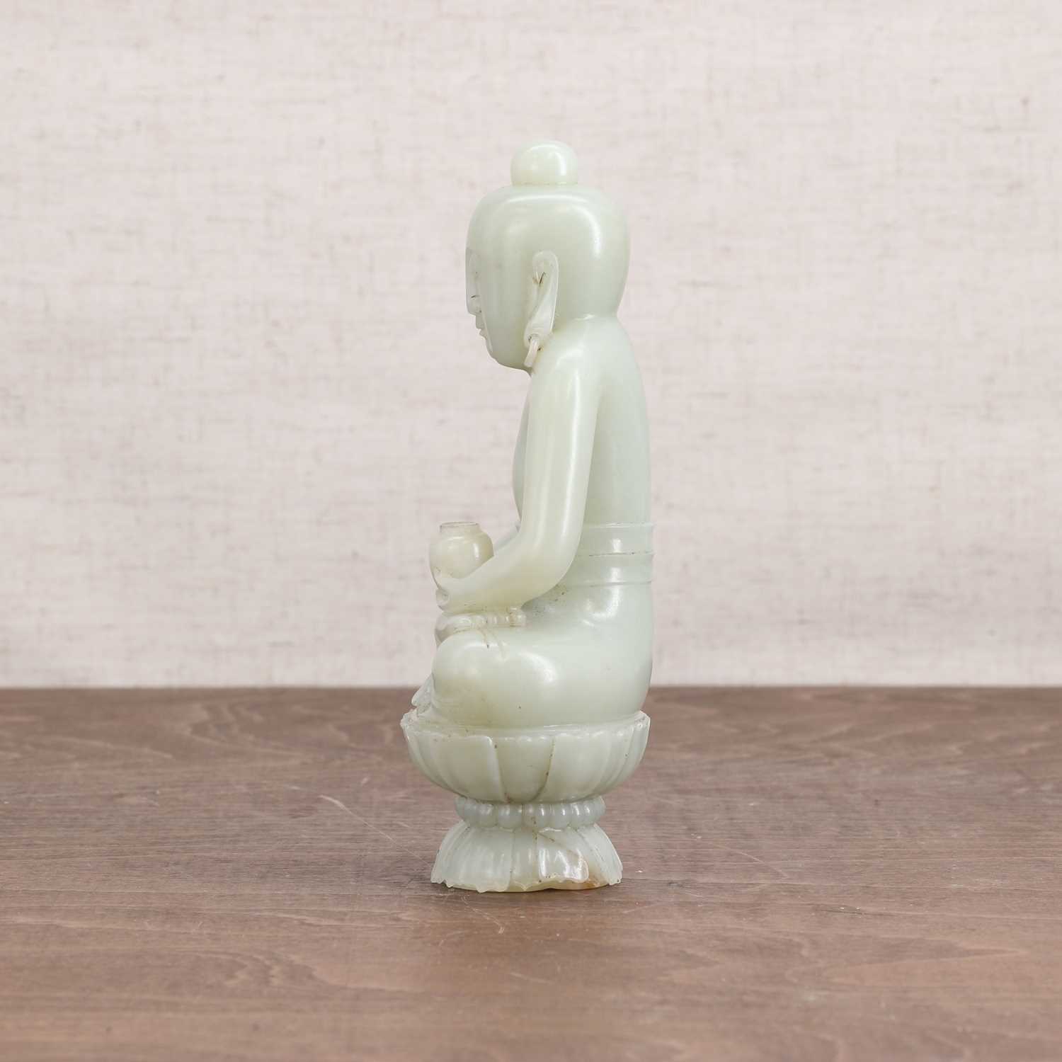 Lot 356 - A Chinese jade Buddha,