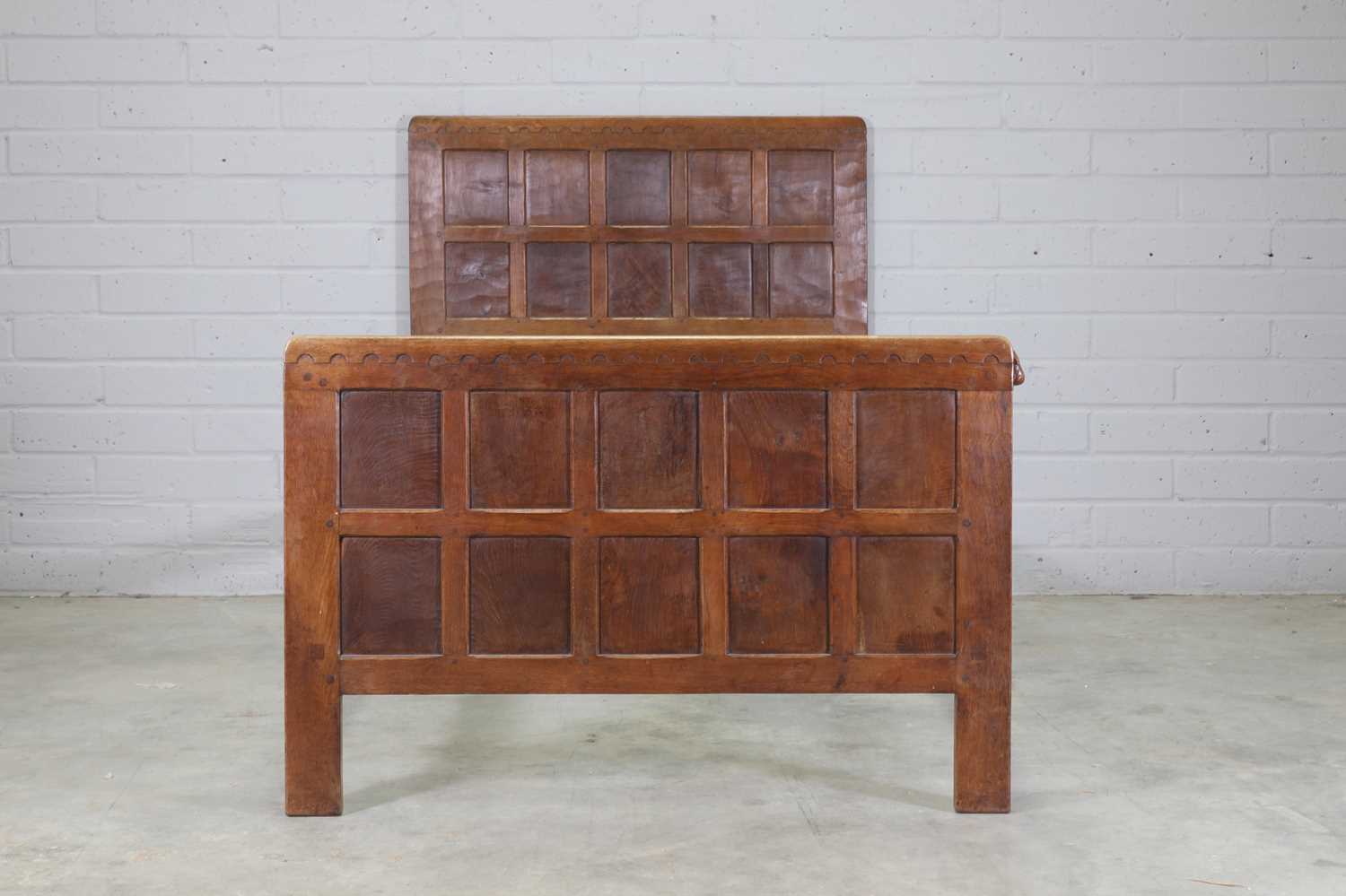 Lot 161 - A Robert 'Mouseman' Thompson oak bed frame,