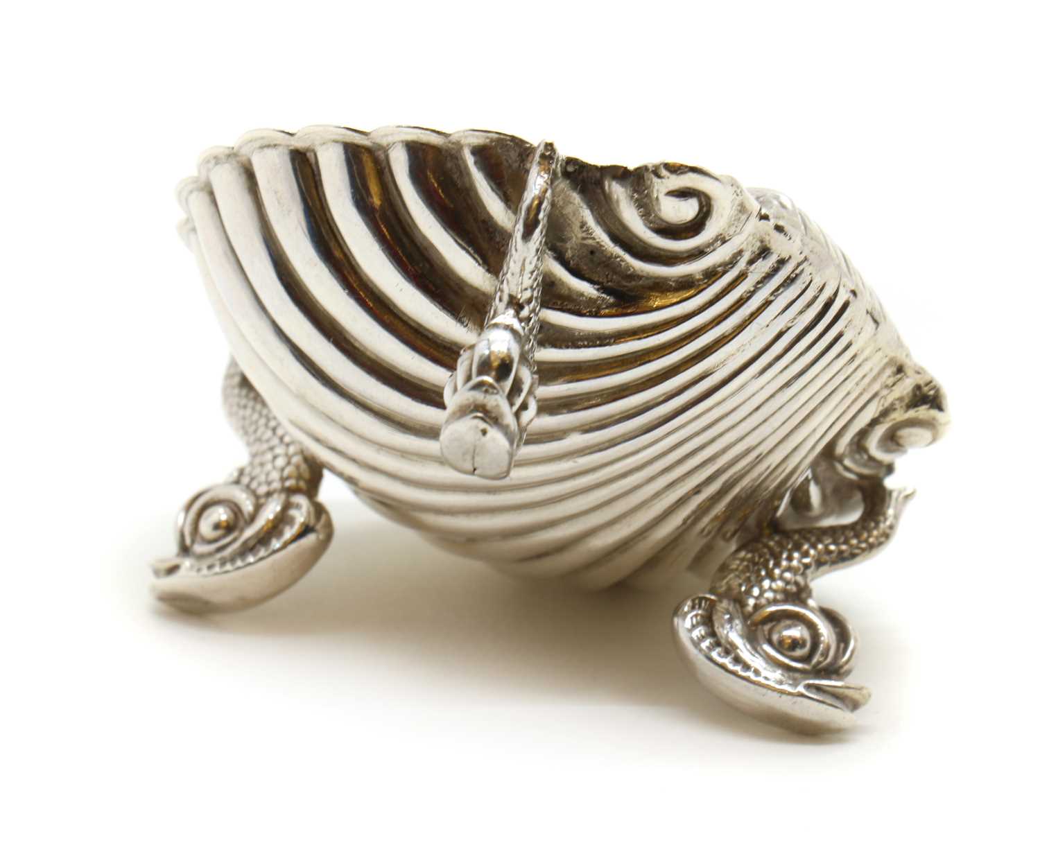Lot 10 - A set of four silver shell salts,