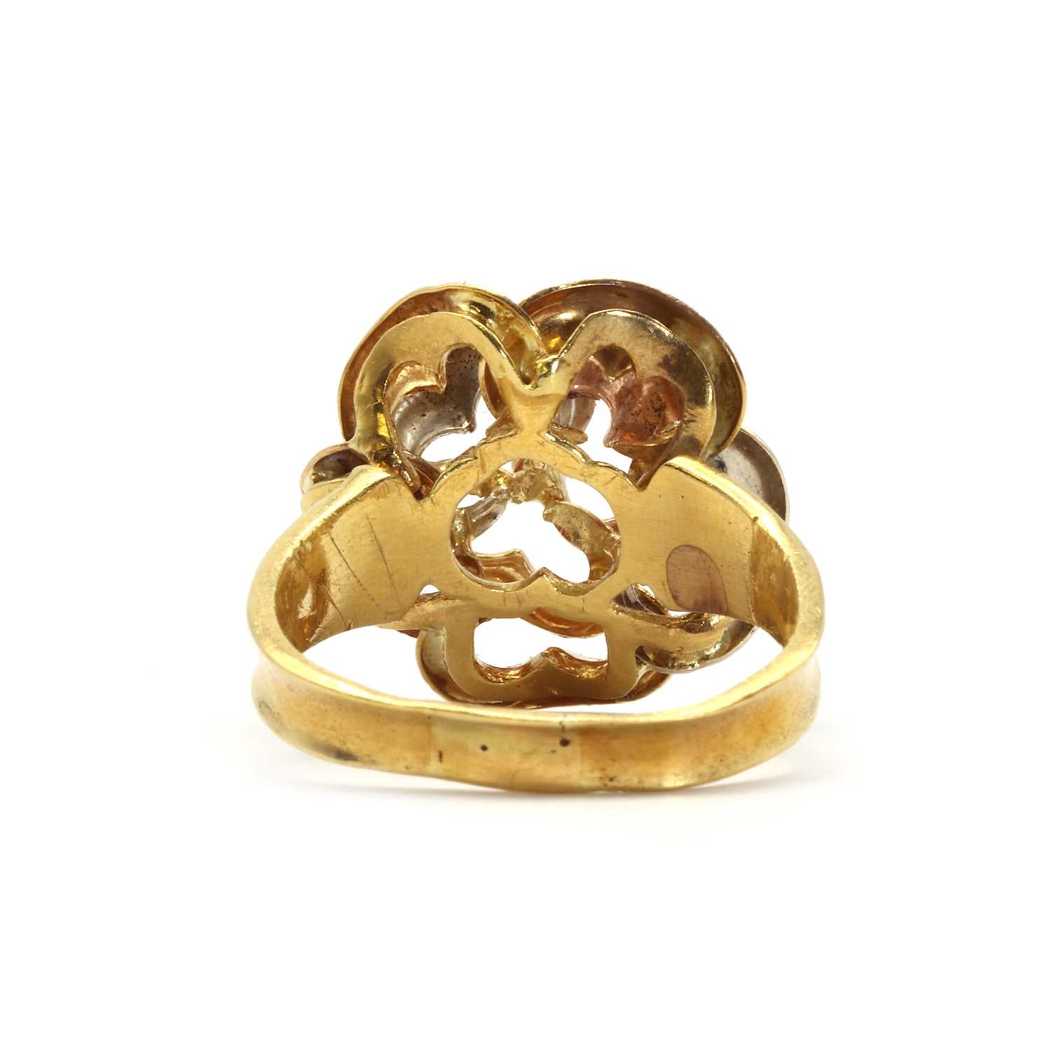 Lot 37 - A two colour gold rose design ring,