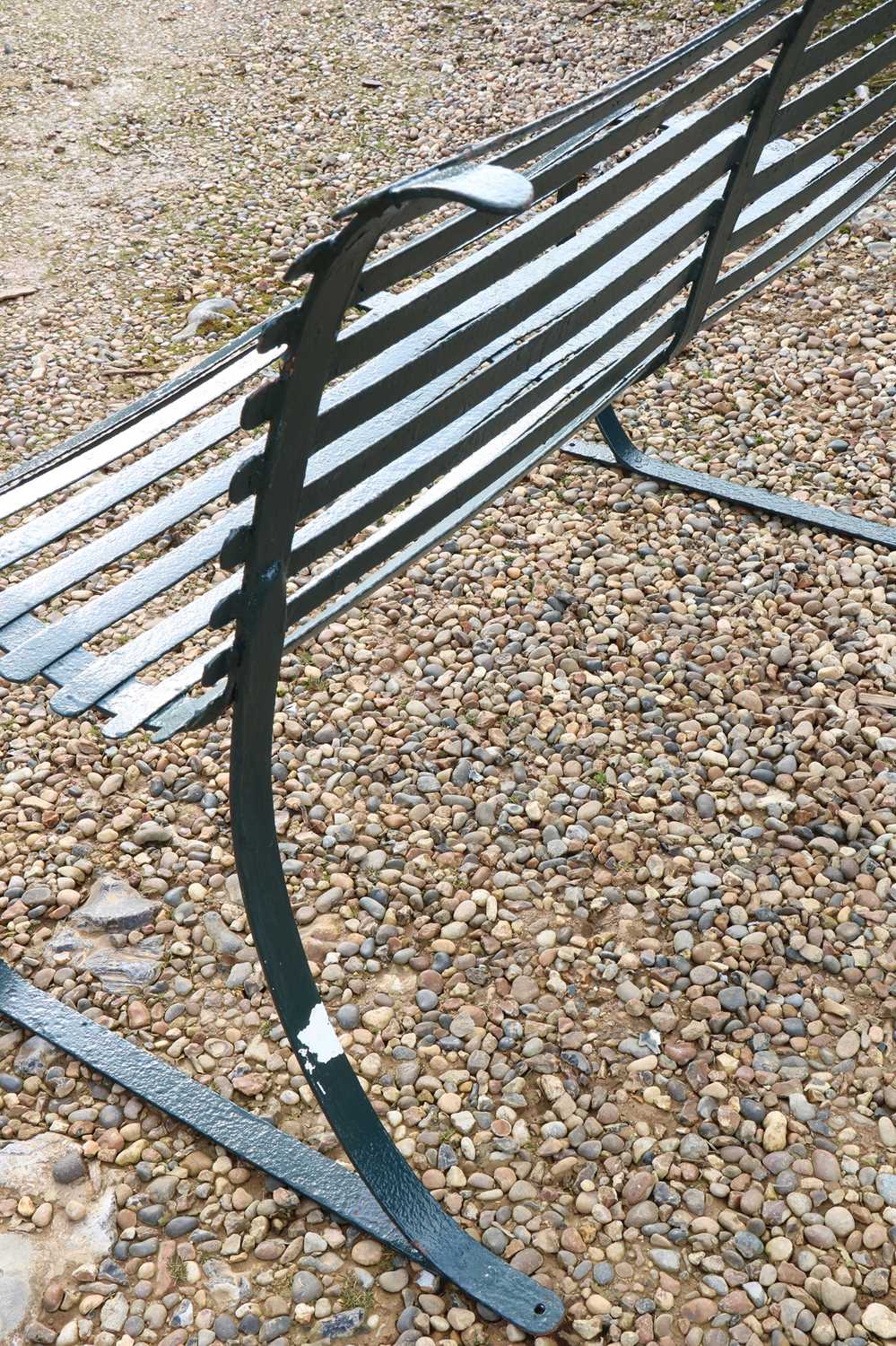 Lot 551 - A cast iron bench
