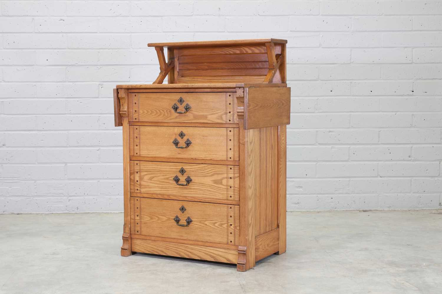 Lot 125 - A Gothic Revival-style oak dresser,