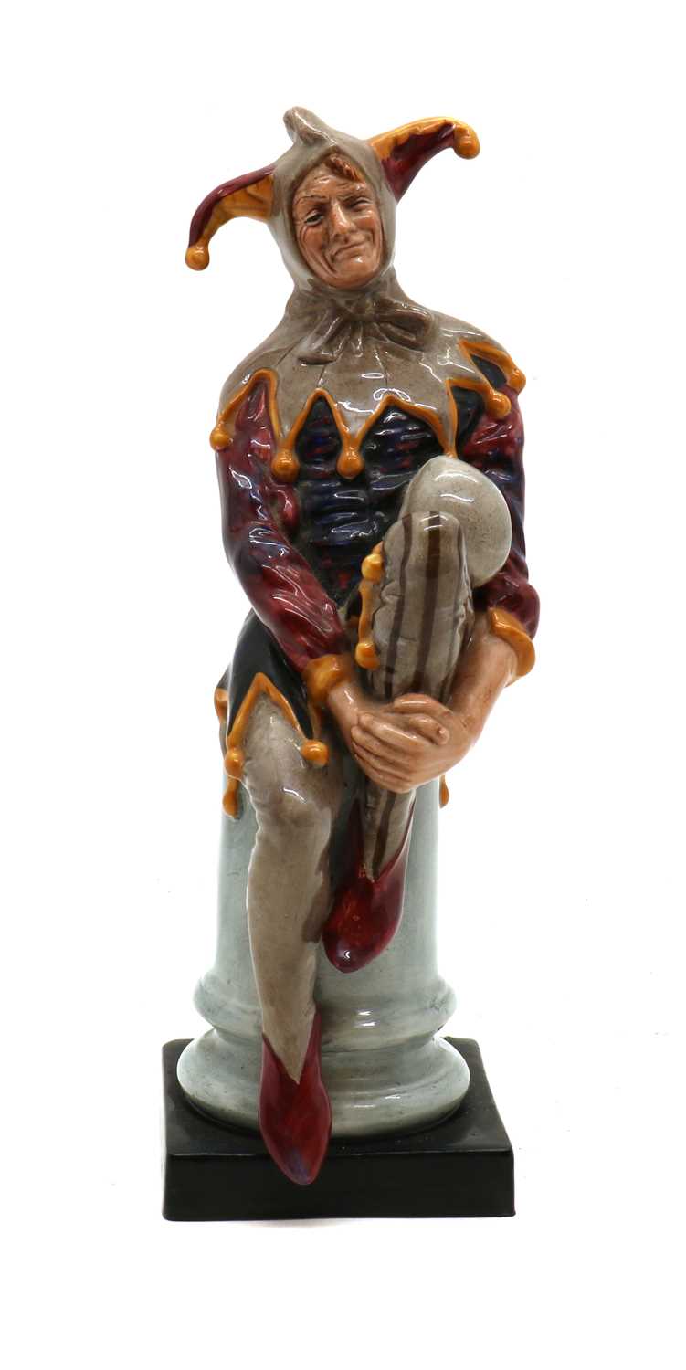 Lot 231 - A Royal Doulton Jester figure,